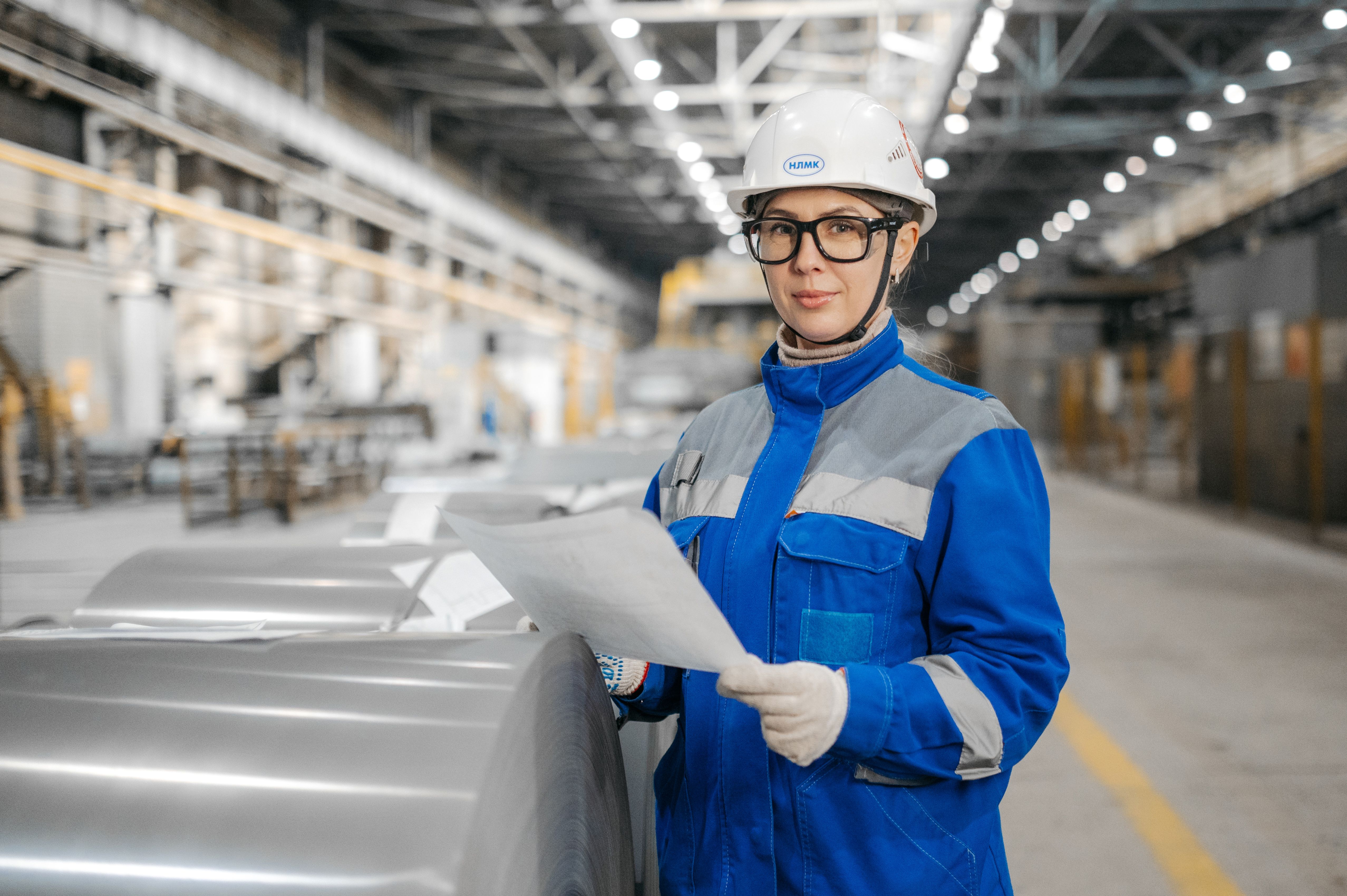 Industrial Worker Using Tablet in Factory · Free Stock Photo