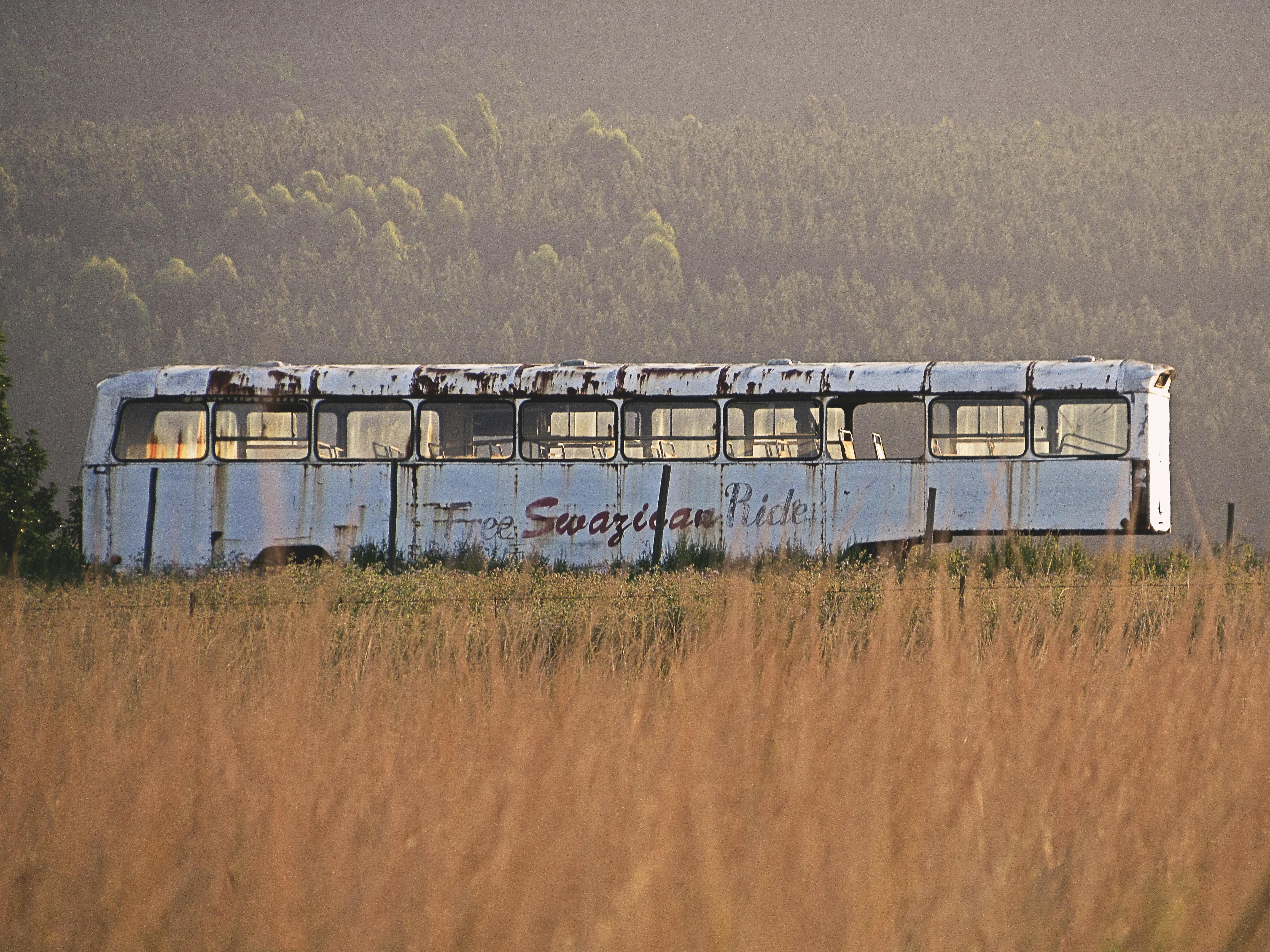Rustic Bus in Malkerns Grassland at Sunset · Free Stock Photo