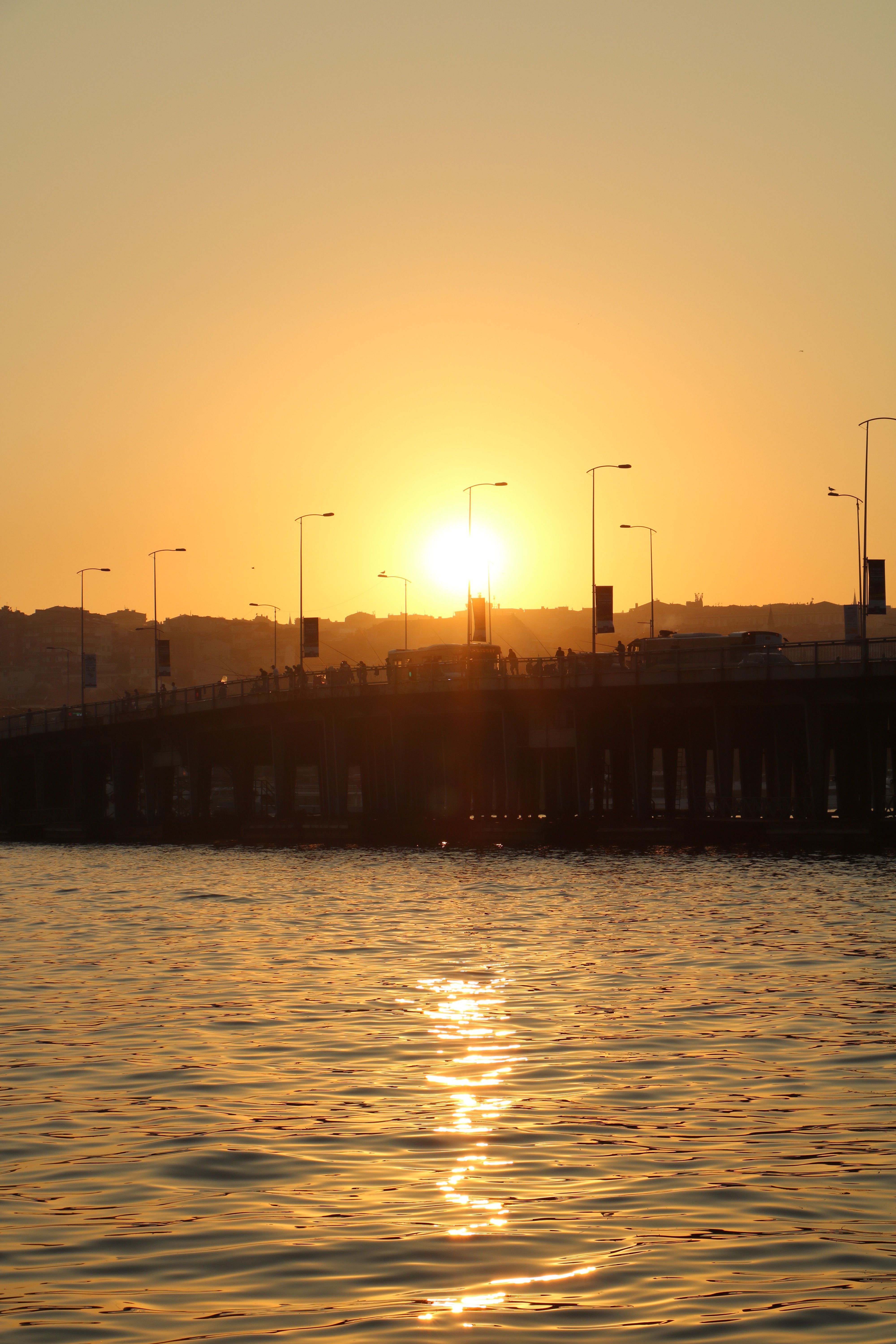 Golden Sunset Over Scenic Bridge Waterview · Free Stock Photo