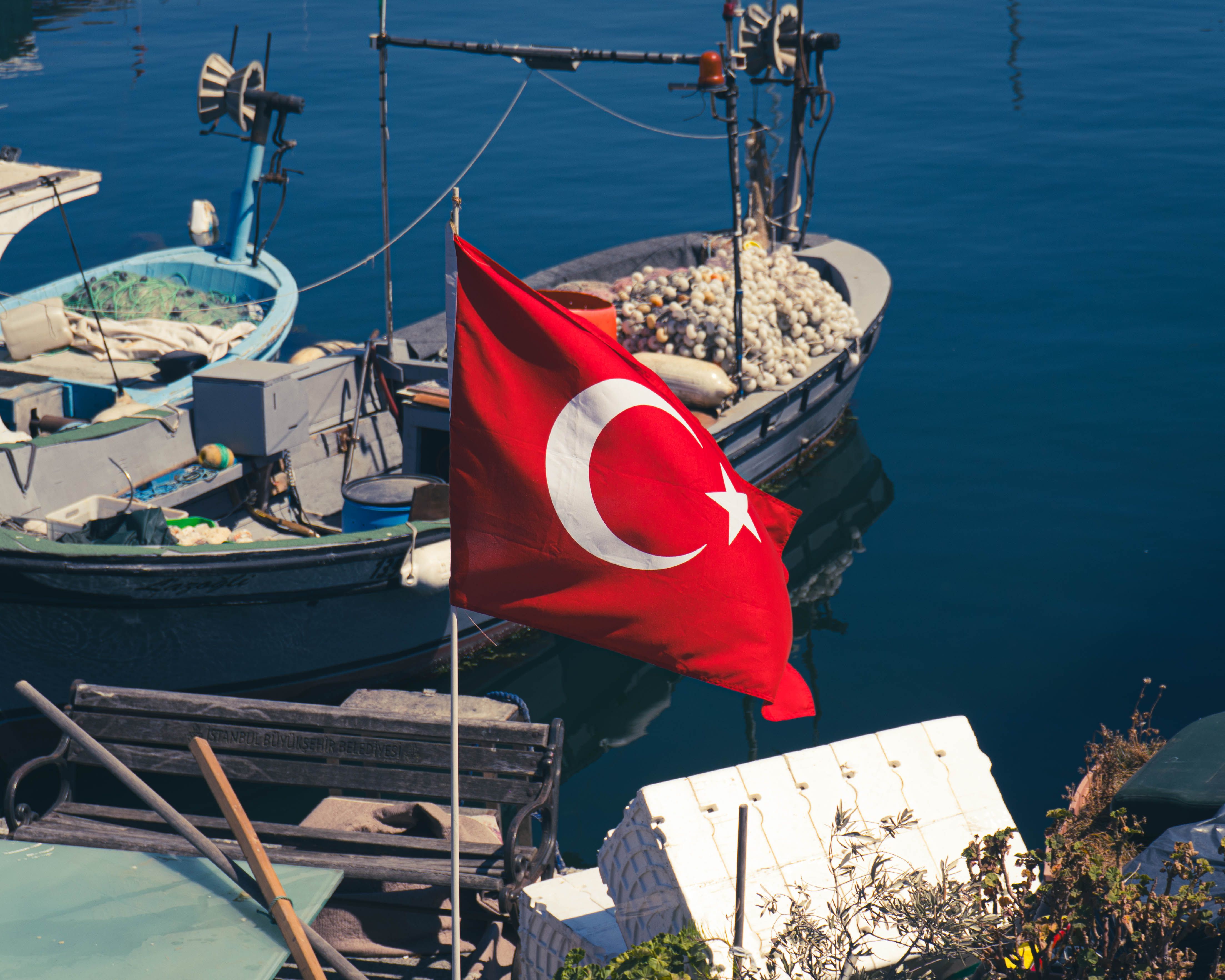 Scenic Turkish Marina with National Flag · Free Stock Photo
