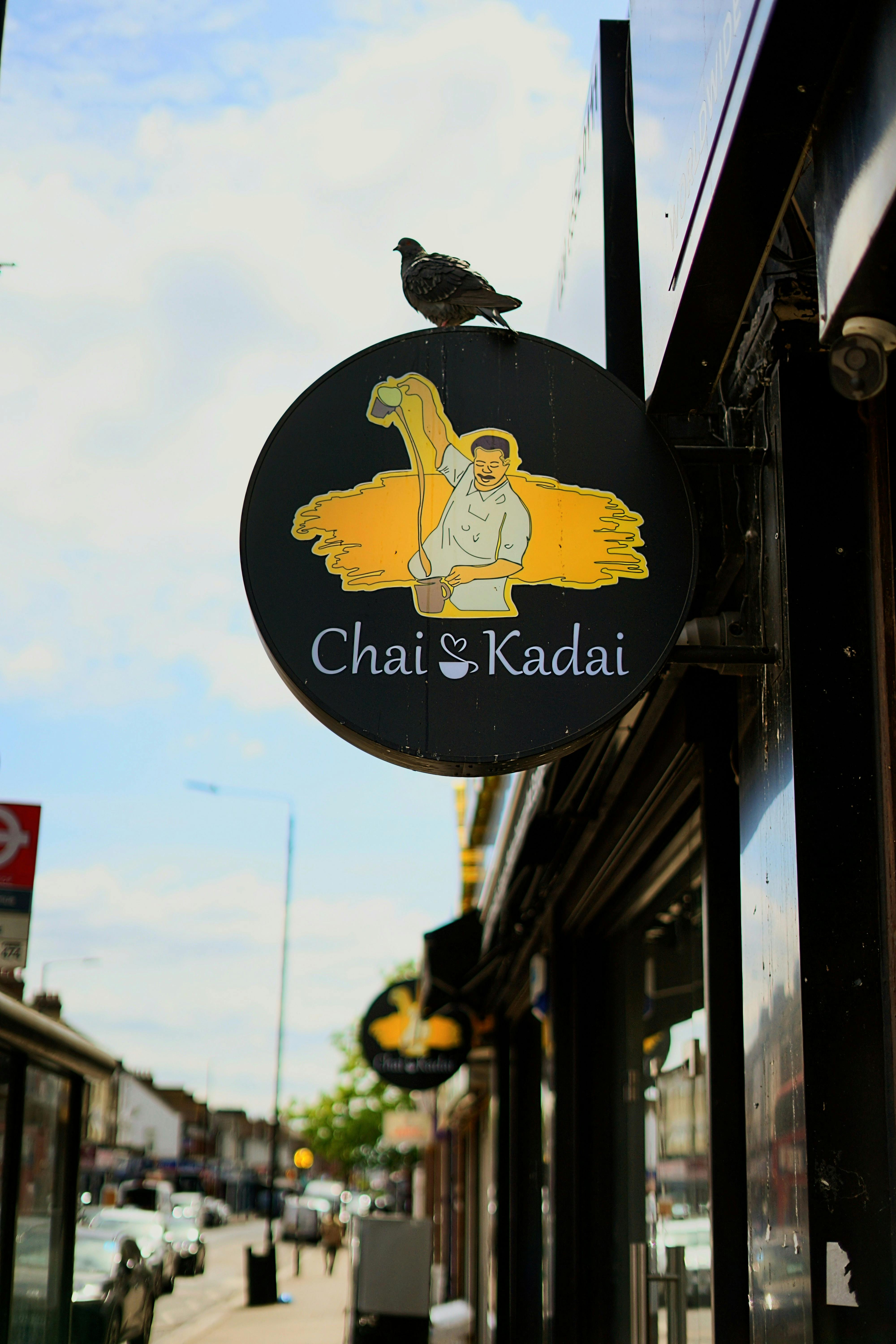 Street View with Chai Shop Sign in England · Free Stock Photo