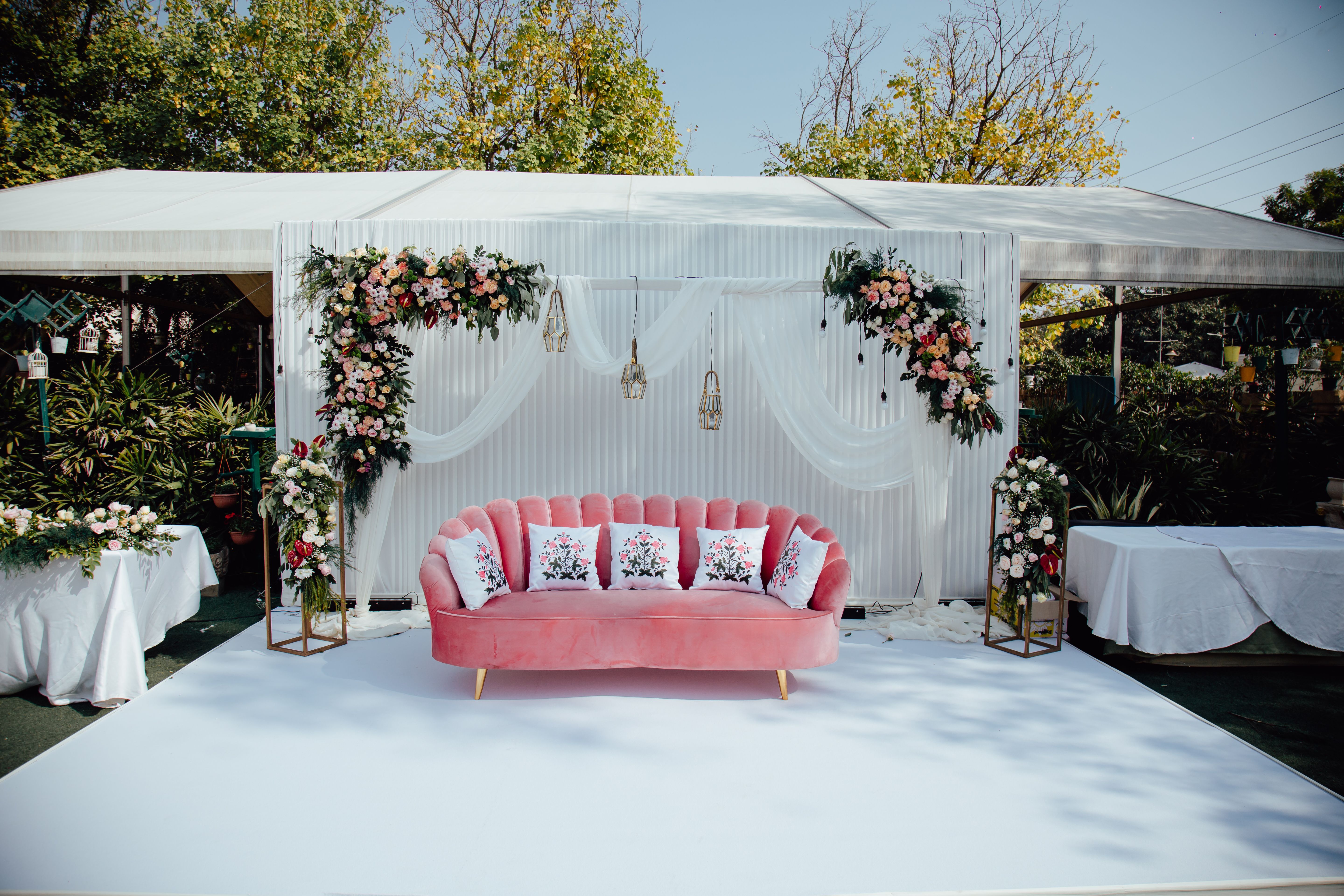 Elegant Outdoor Wedding Setup with Floral Decorations · Free Stock Photo