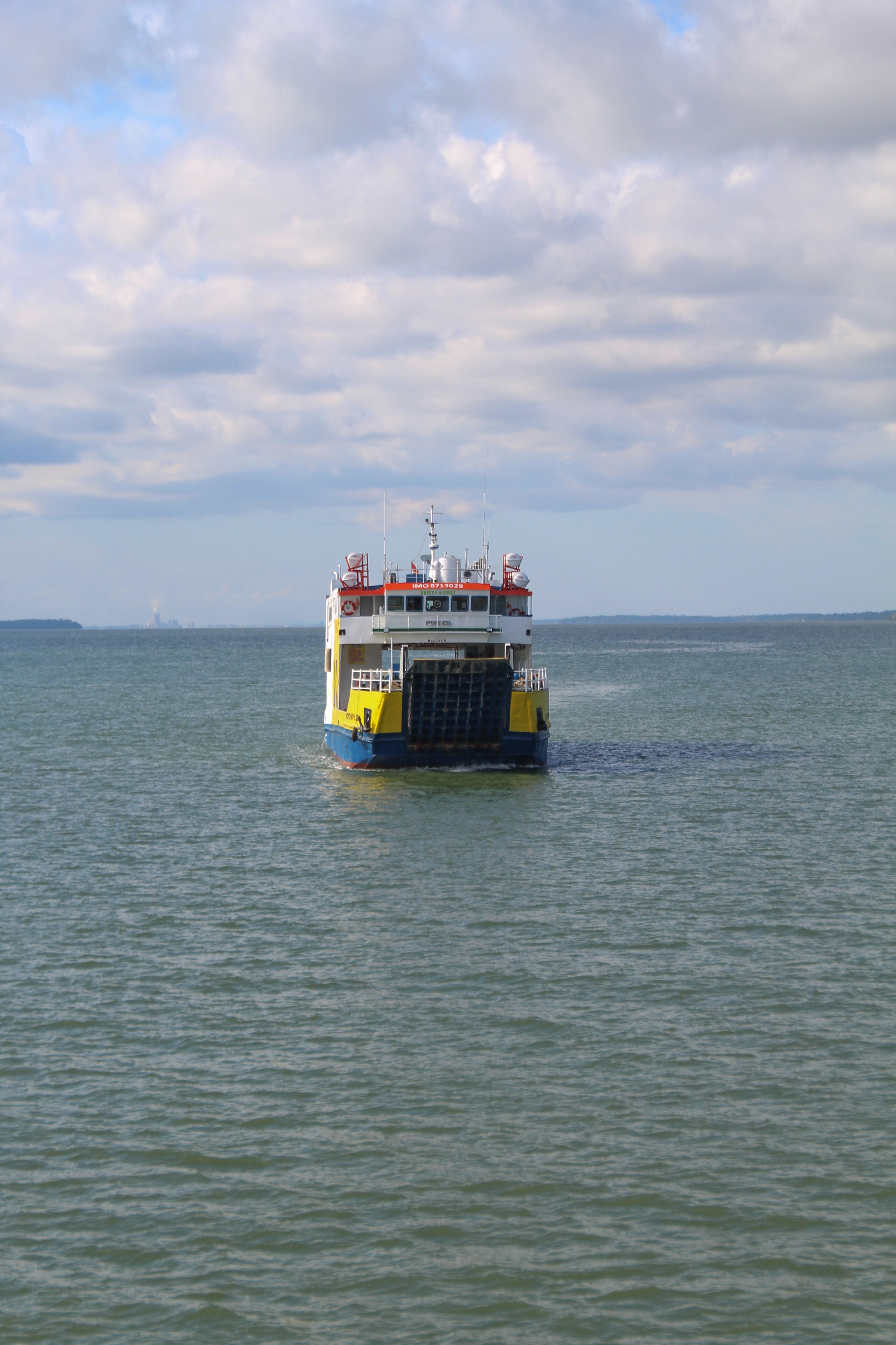 Passenger Ferry Sailing on a Calm Blue Sea · Free Stock Photo