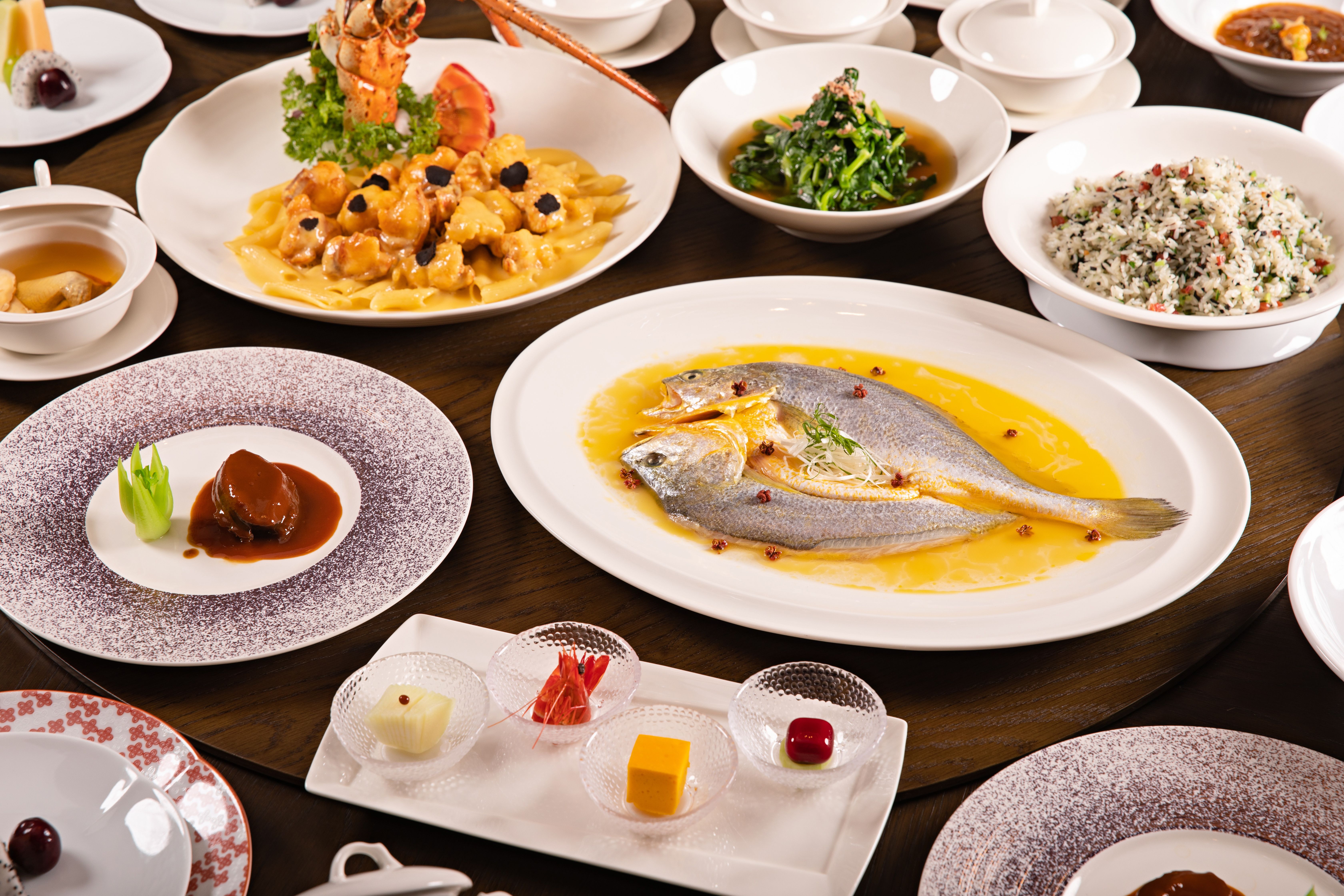 Exquisite Seafood Feast with Asian Fusion Dishes · Free Stock Photo