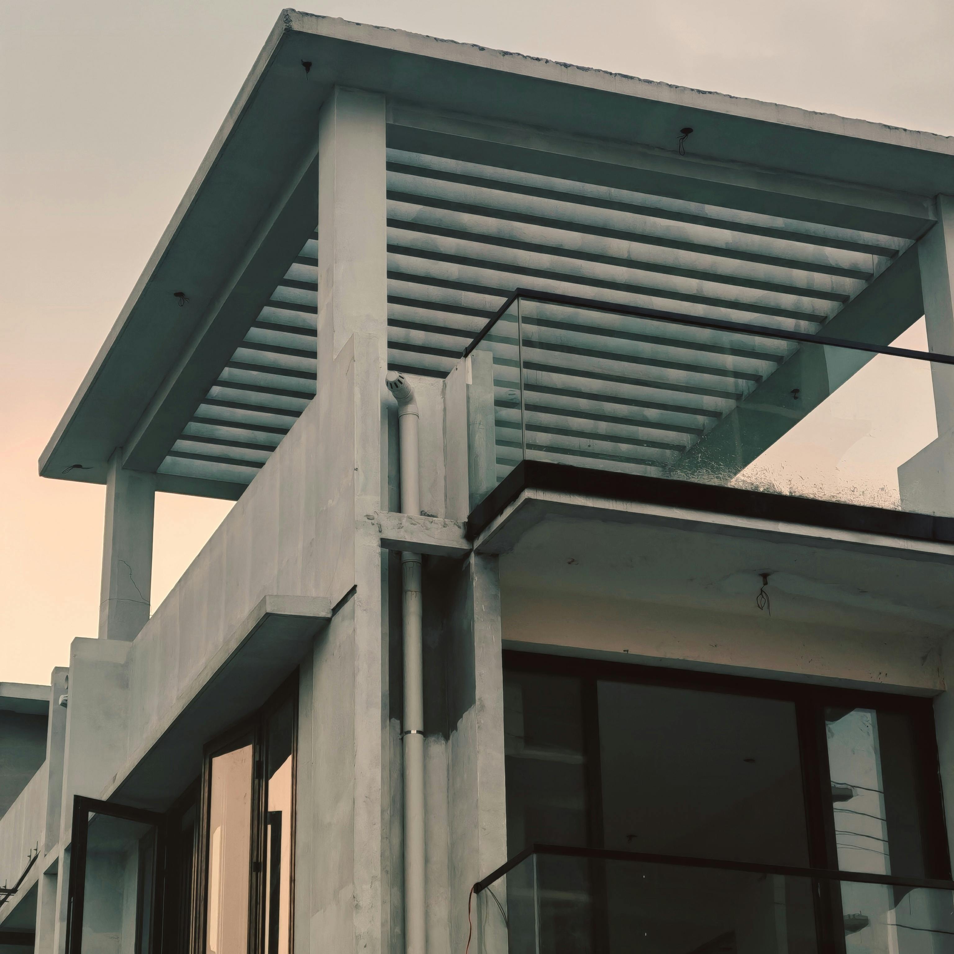 Modern Minimalist Concrete Building Design · Free Stock Photo