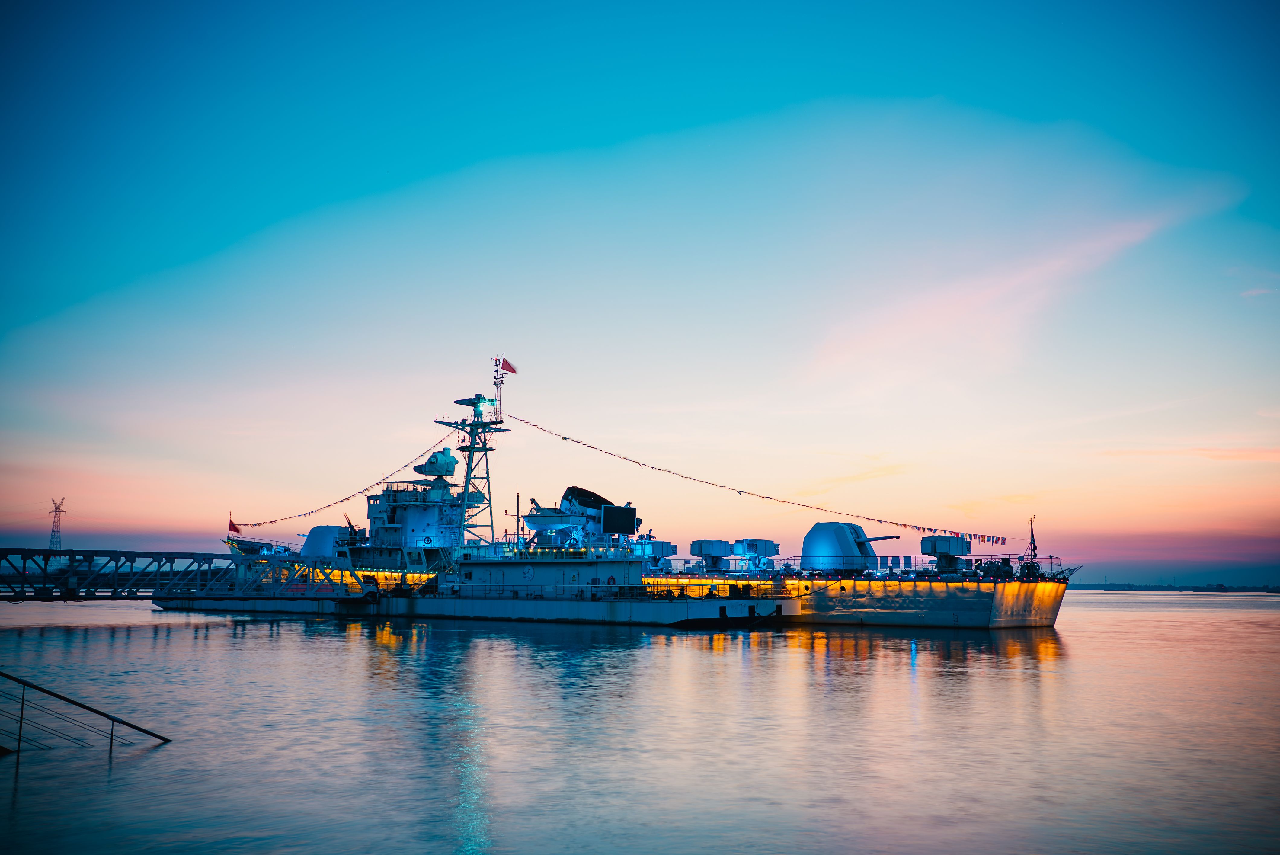 Navy Ship at Twilight on Calm Waters · Free Stock Photo