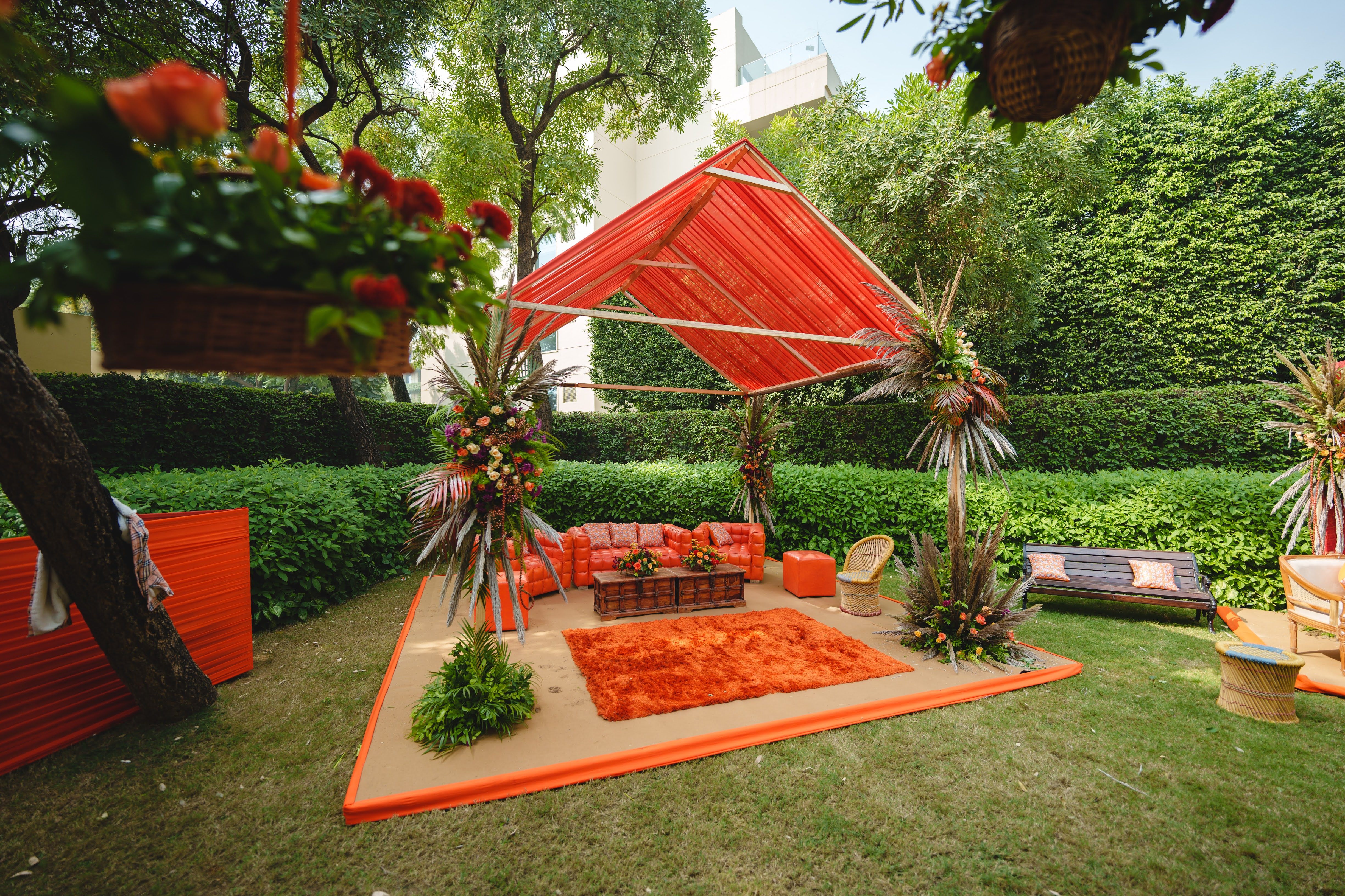 Vibrant Outdoor Garden Seating with Orange Decor · Free Stock Photo