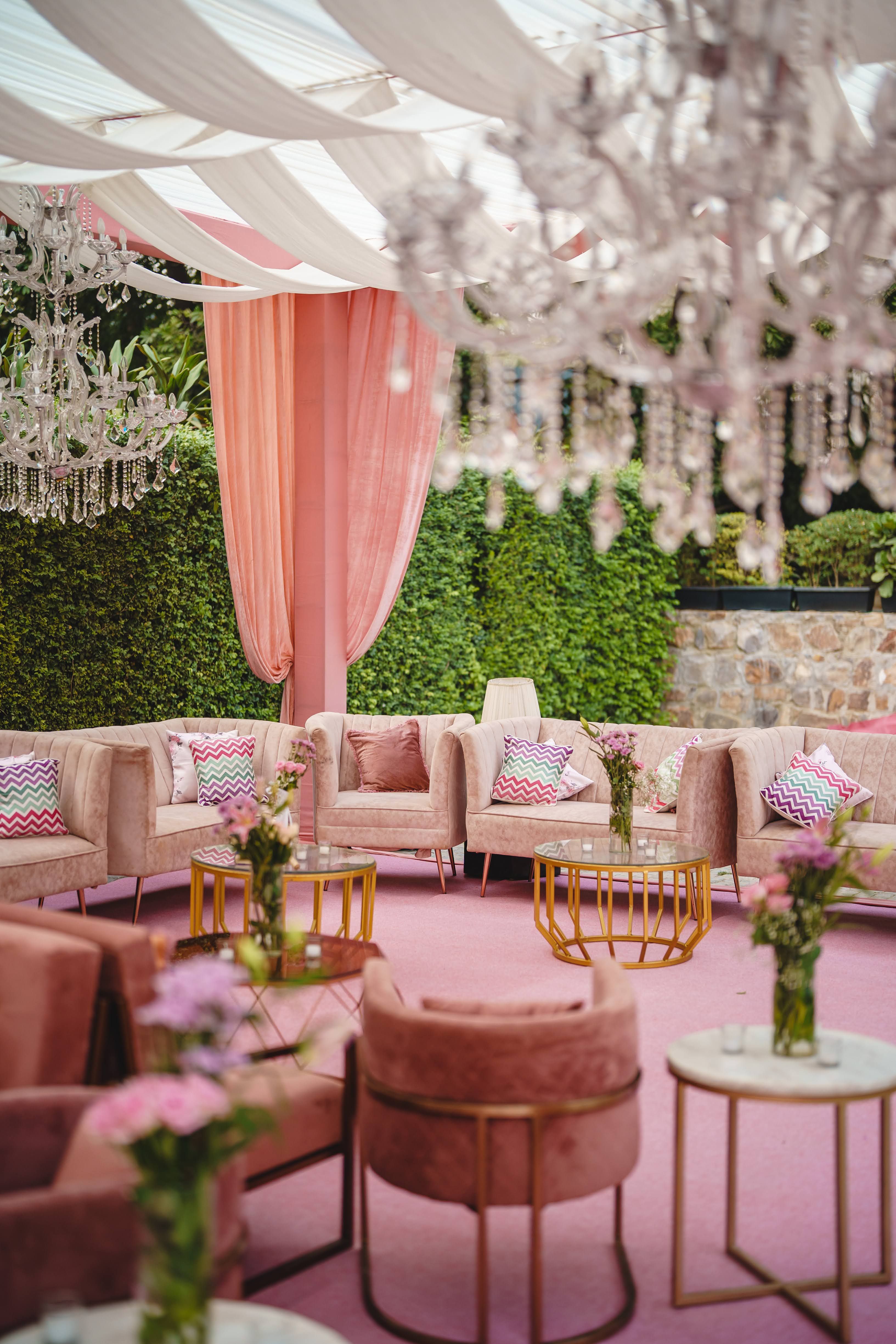 Elegant Pink Garden Lounge with Crystal Chandeliers · Free Stock Photo