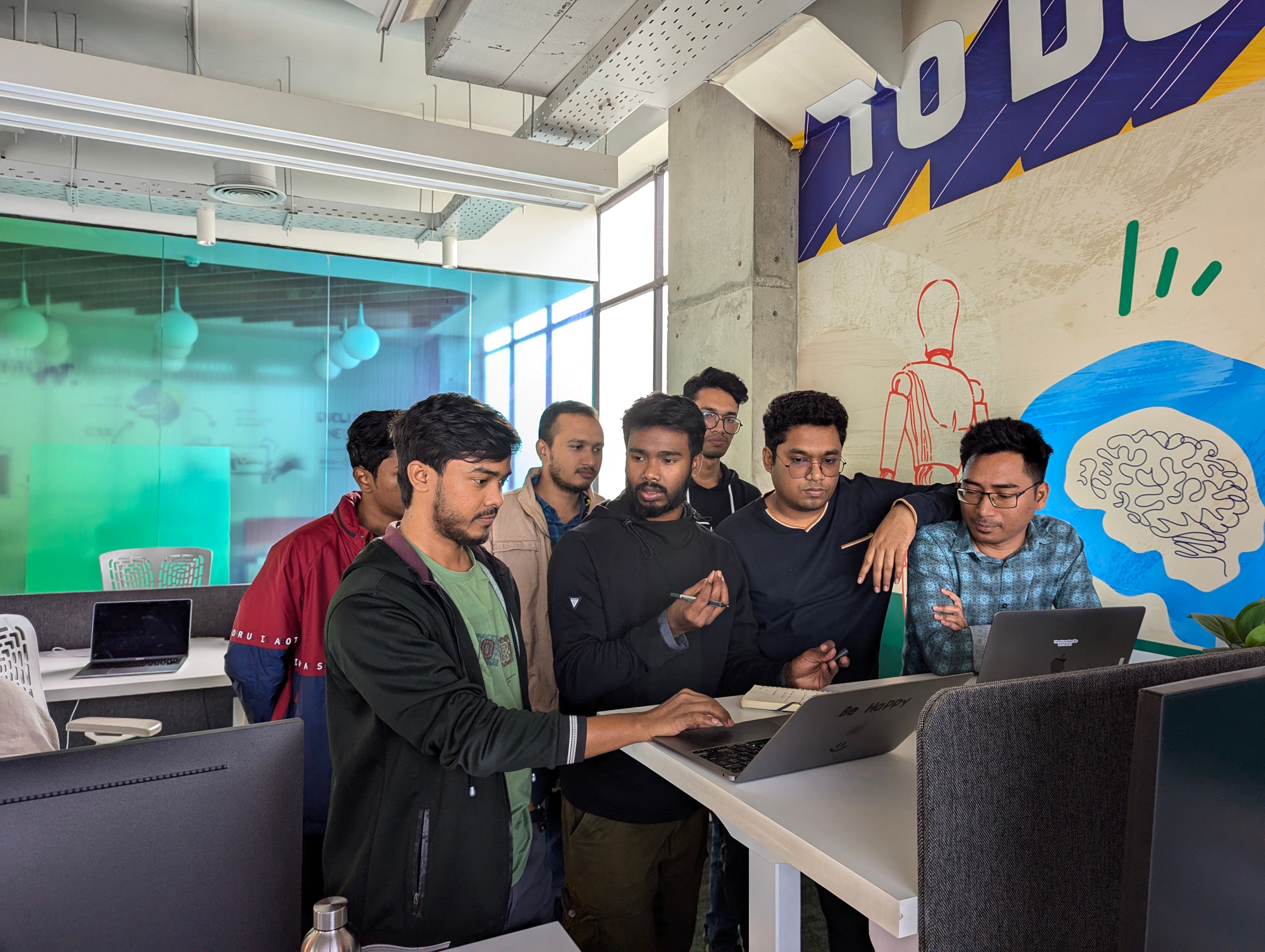Collaborative Teamwork in a Modern Office Setting · Free Stock Photo