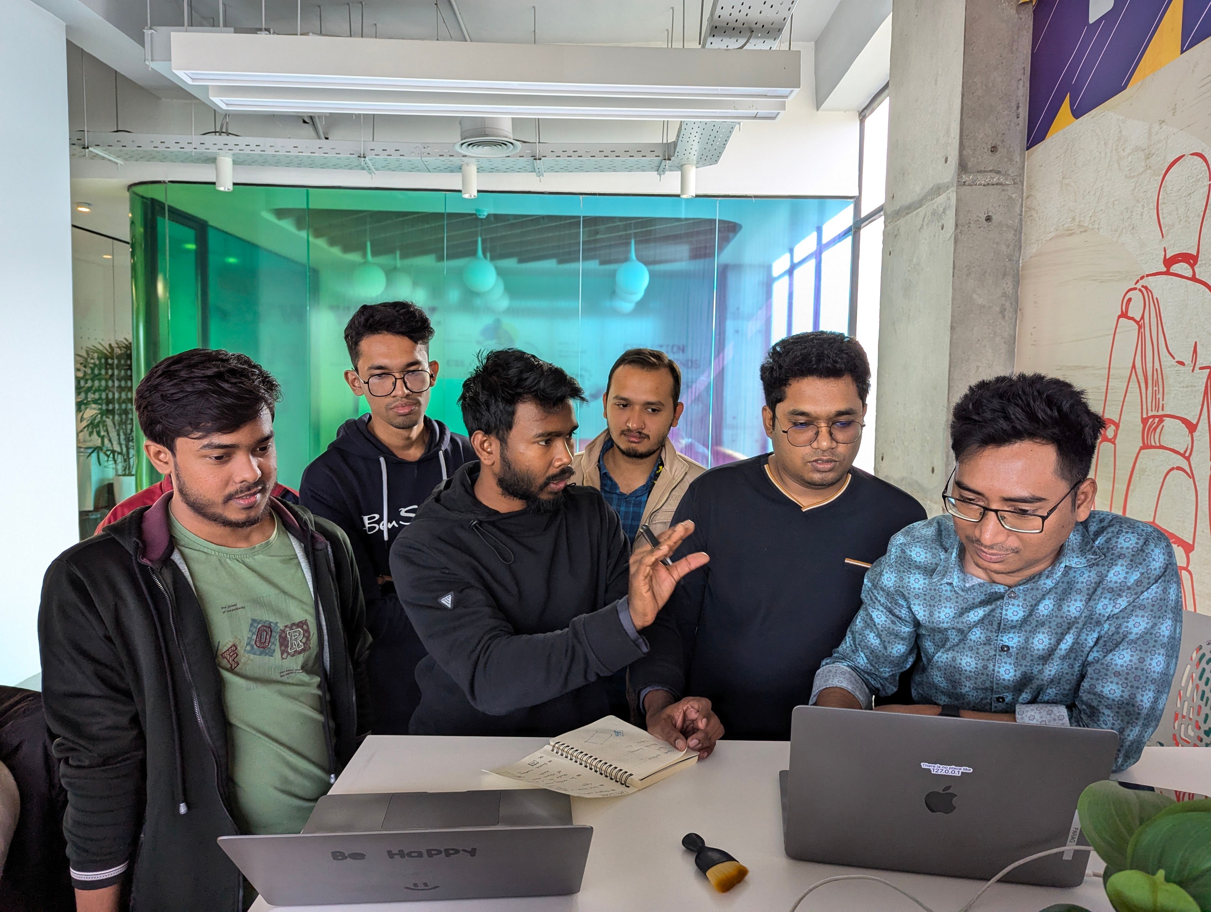 Collaborative Teamwork in a Modern Office Setting · Free Stock Photo