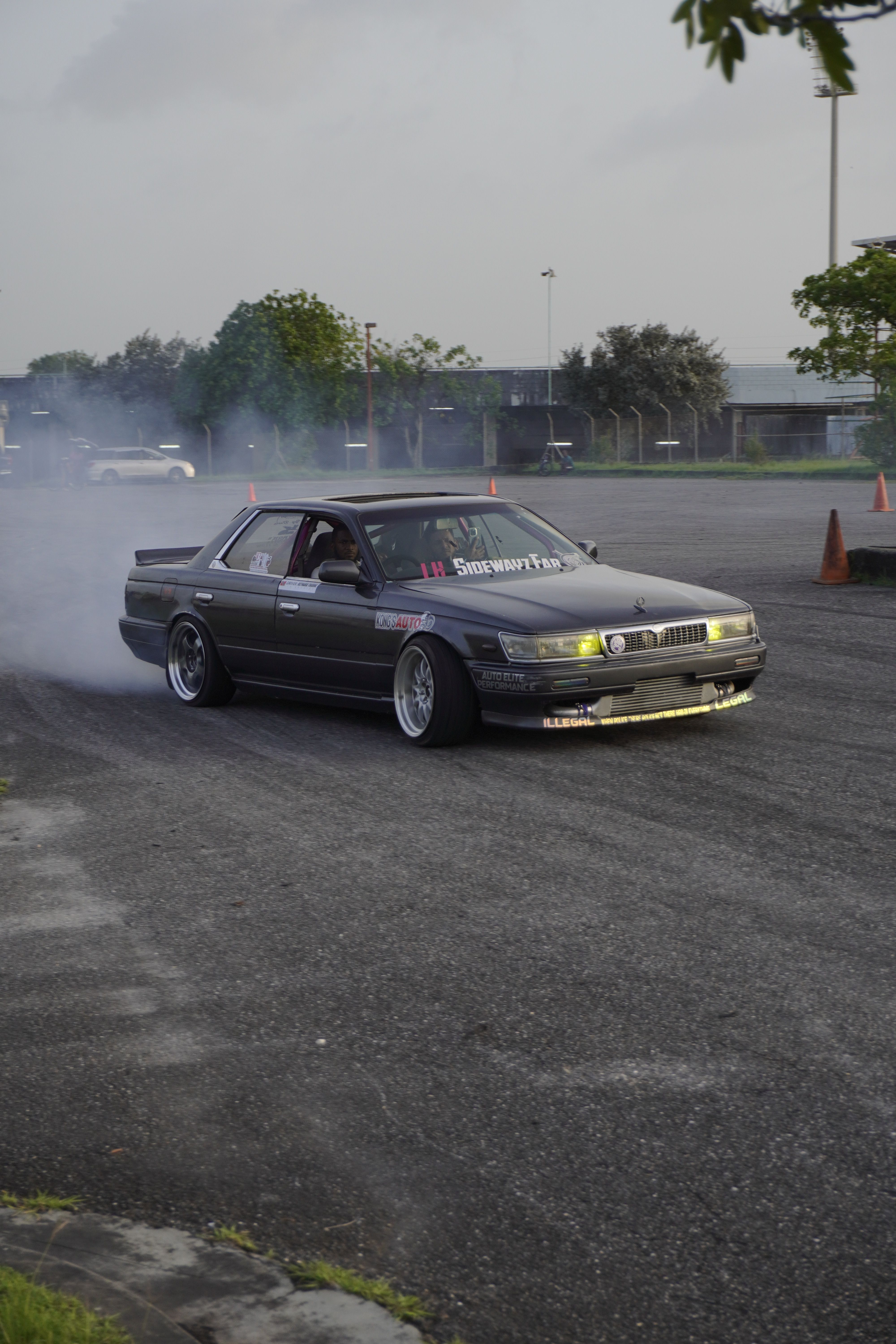 Dynamic Drifting Car at Outdoor Track · Free Stock Photo
