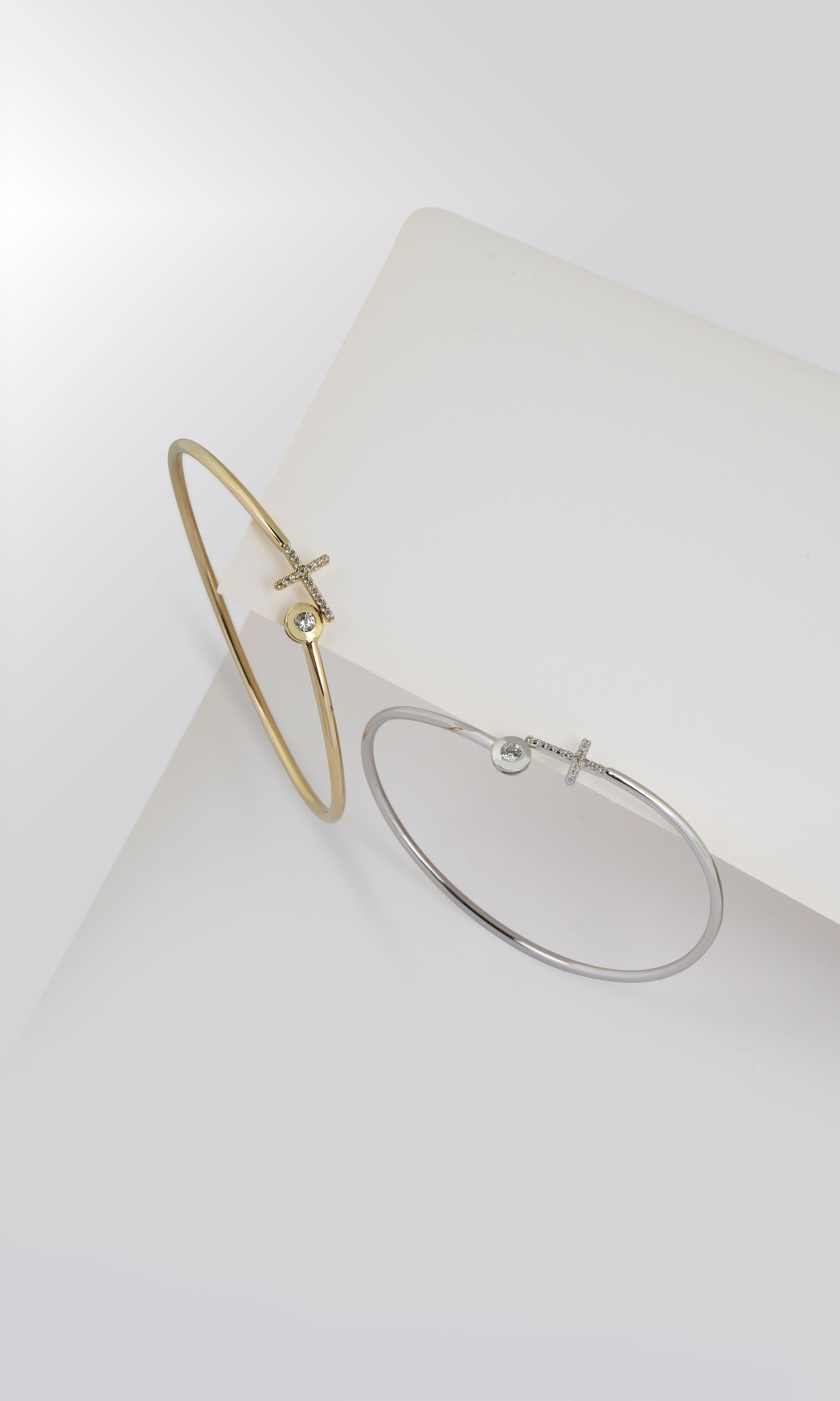 Elegant Gold and Silver Bangles on Display · Free Stock Photo