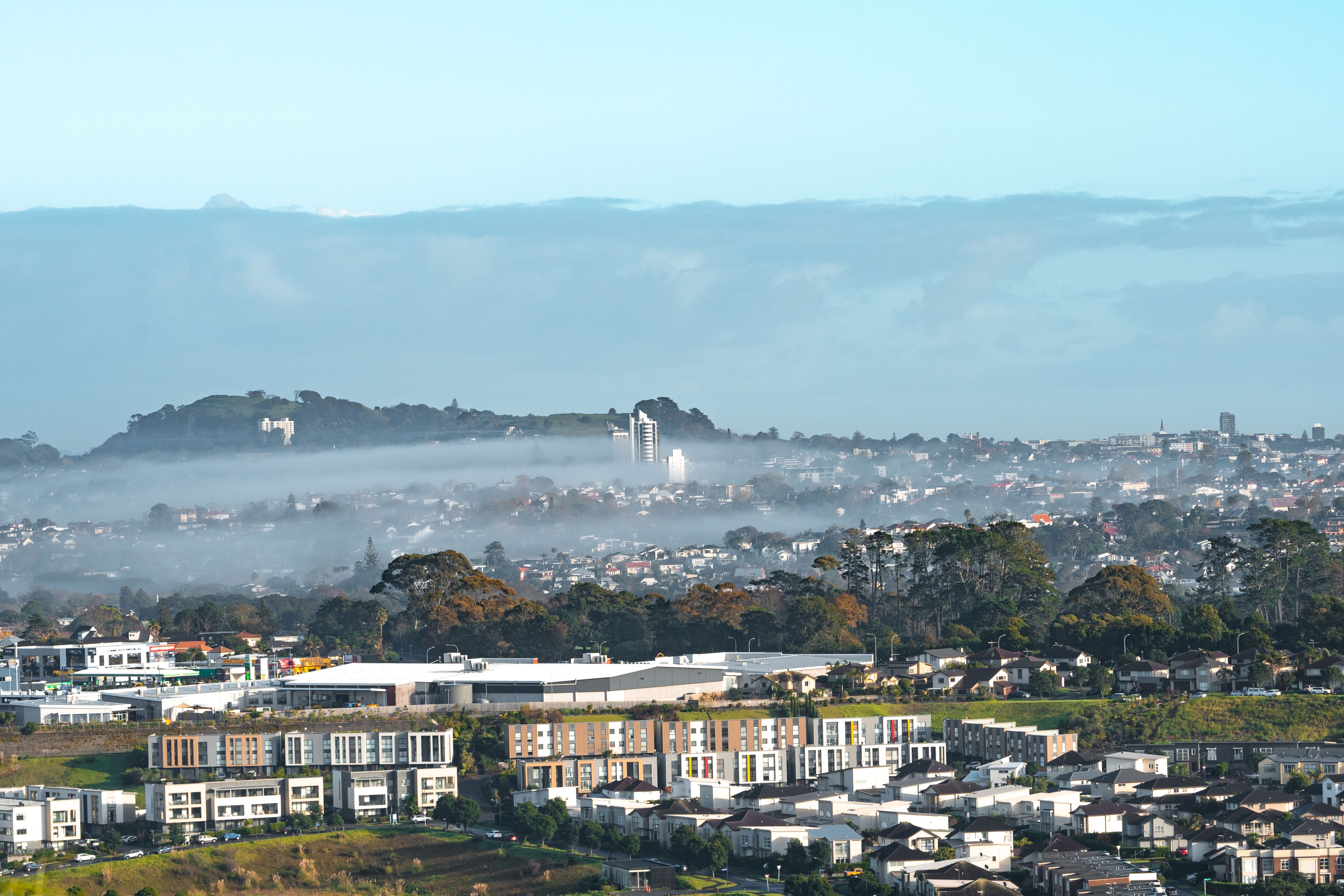 Scenic Auckland Suburb with Morning Fog · Free Stock Photo