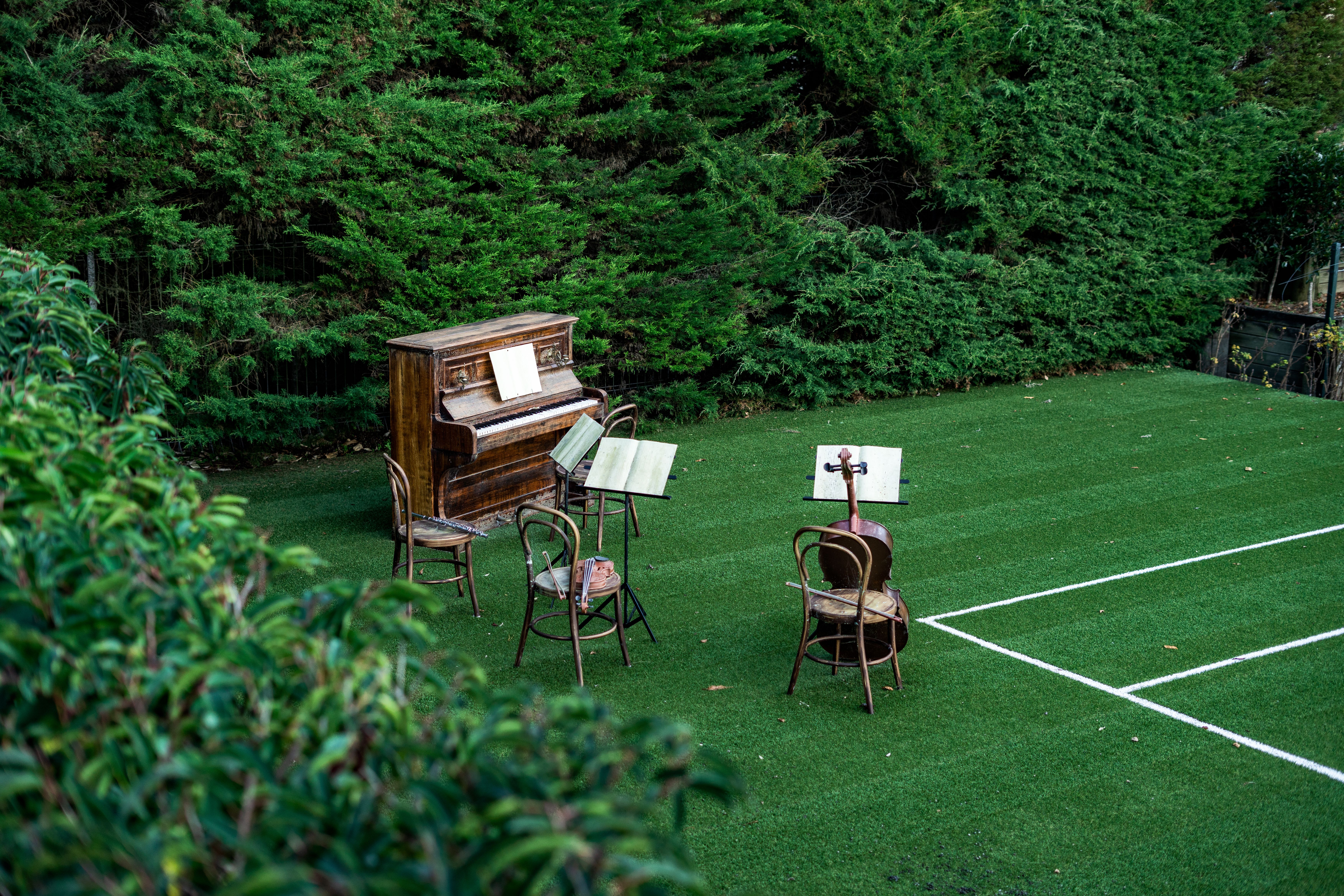 Outdoor Musical Setup with Piano in Garden · Free Stock Photo