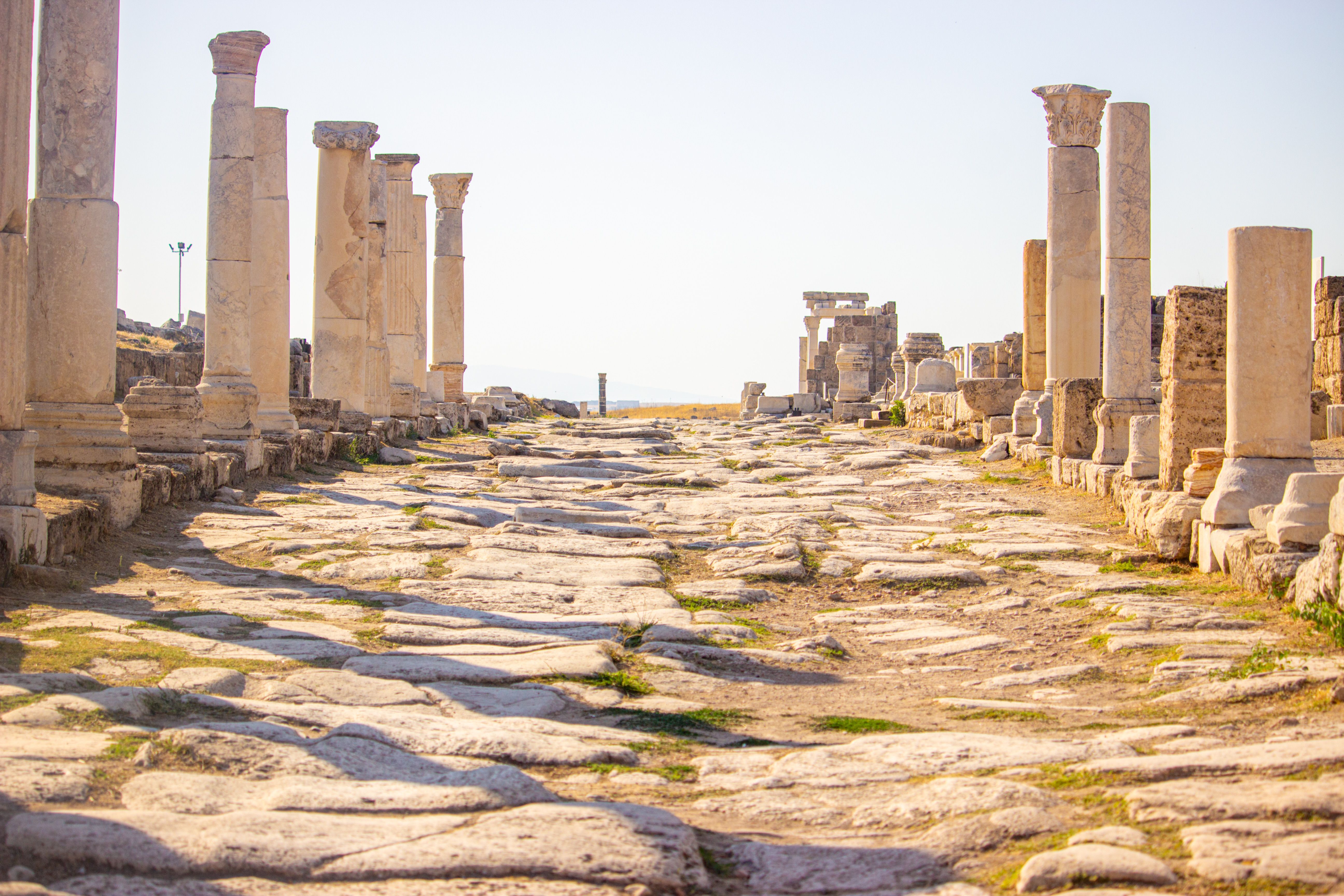 Ancient Roman Road with Stone Columns in Ruins · Free Stock Photo