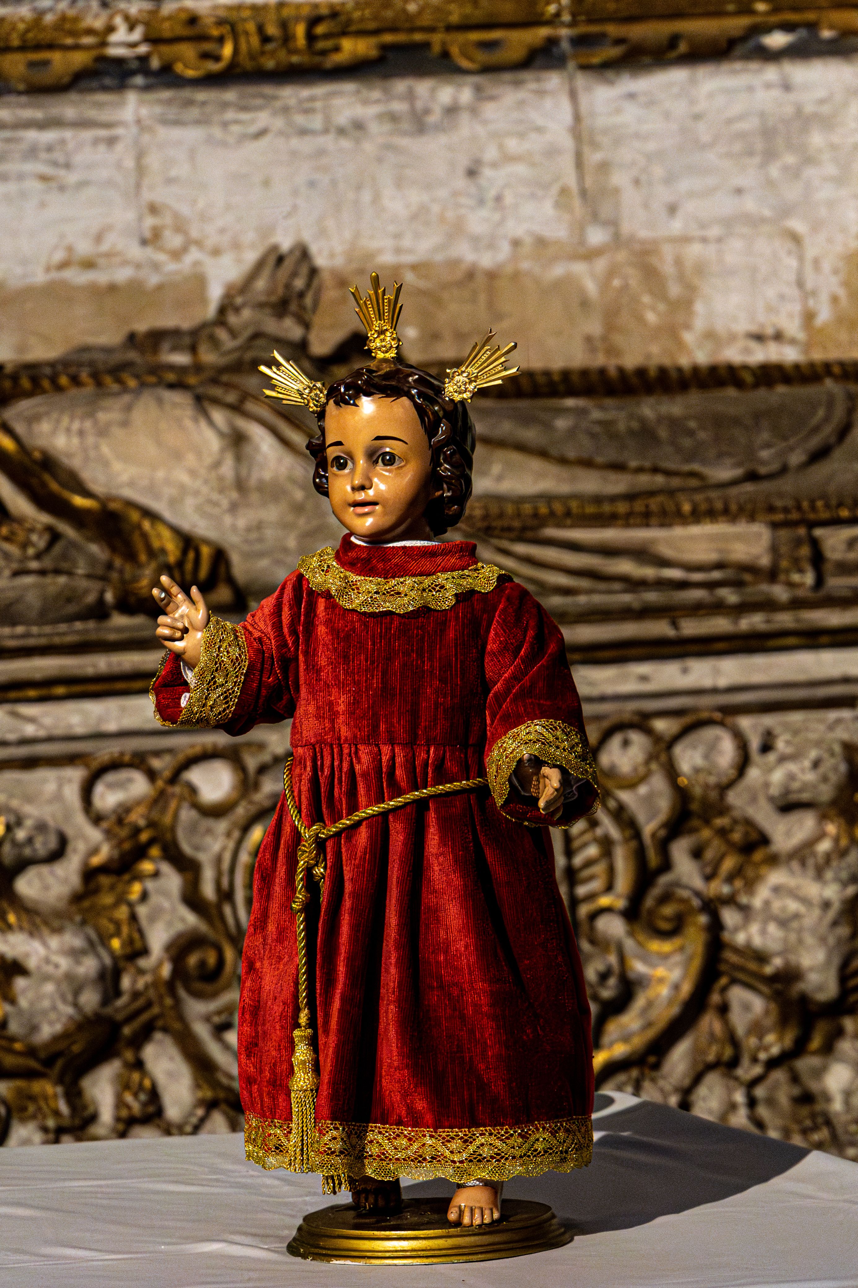 Religious Sculpture of Child in Ornate Robe · Free Stock Photo