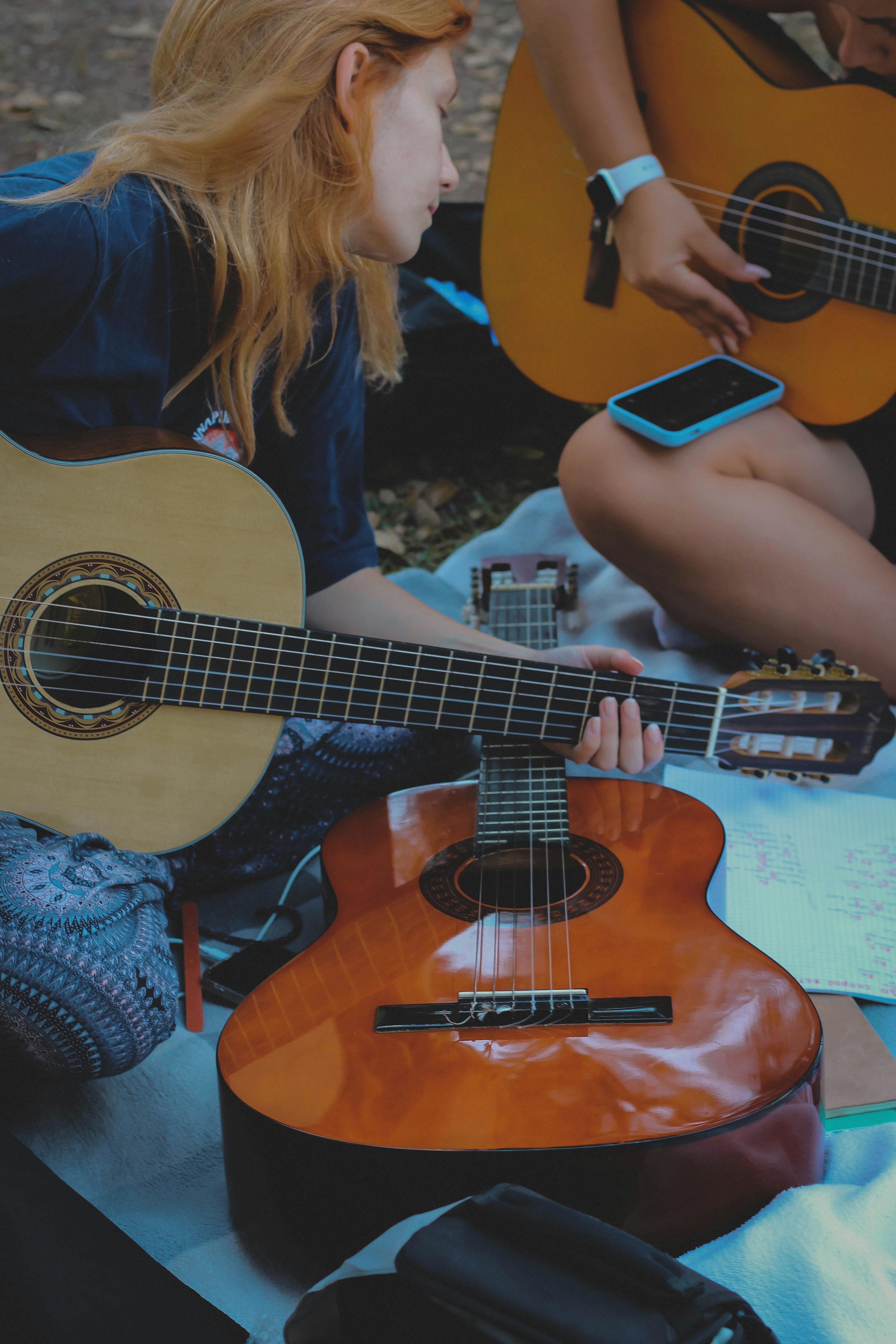 Outdoor Acoustic Guitar Jam Session with Friends · Free Stock Photo
