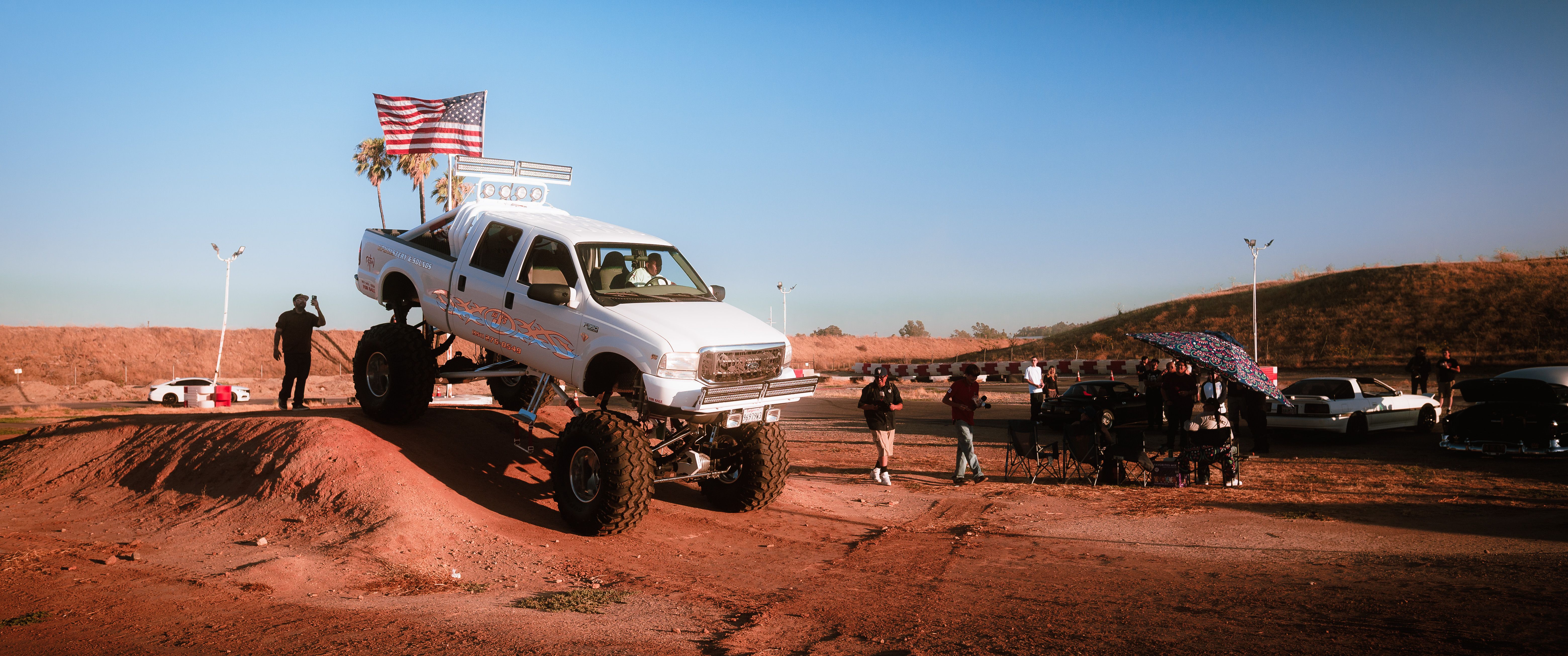 Off-Road Truck Adventure at Sunset Event · Free Stock Photo