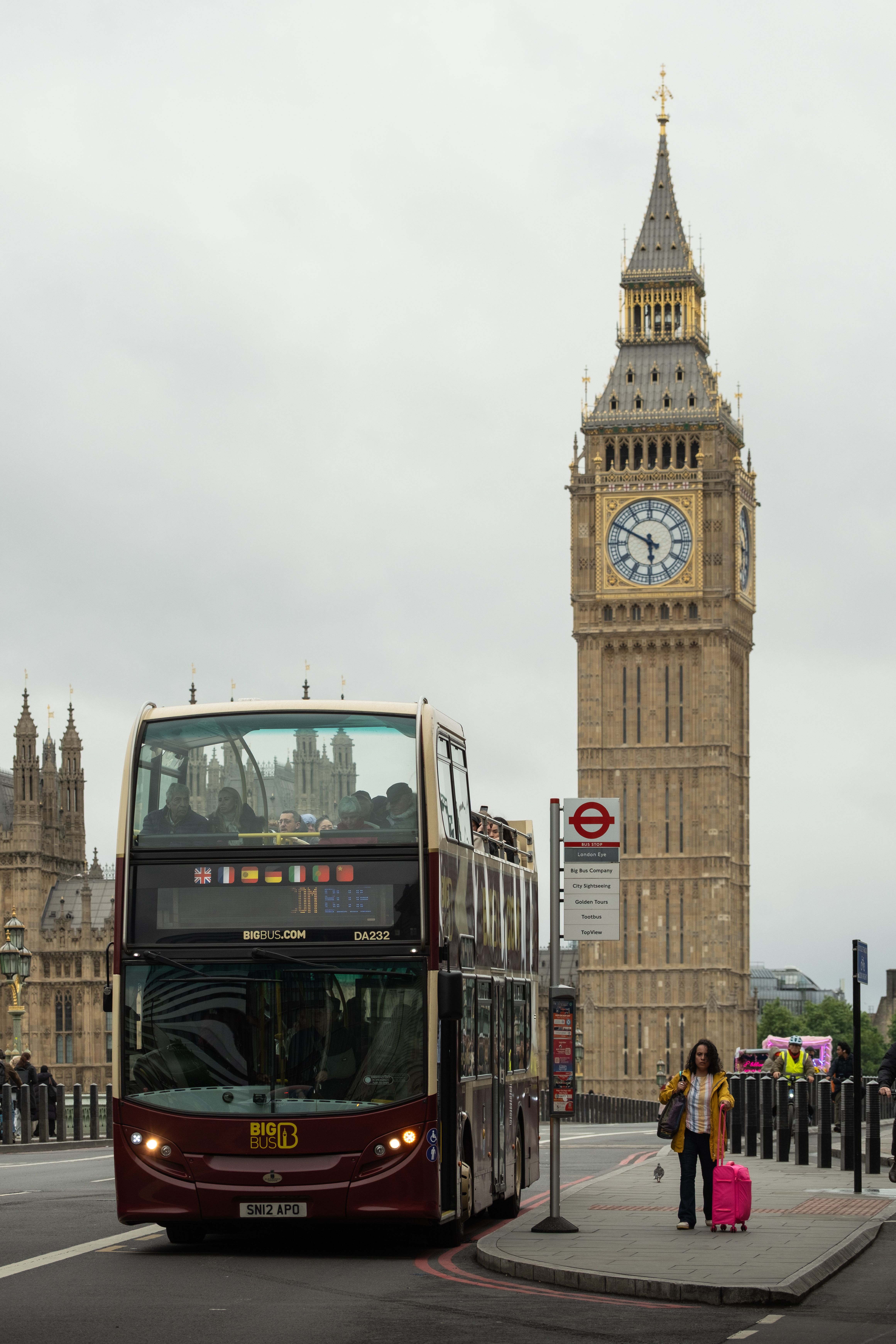 Iconic London Bus with Big Ben in Background · Free Stock Photo