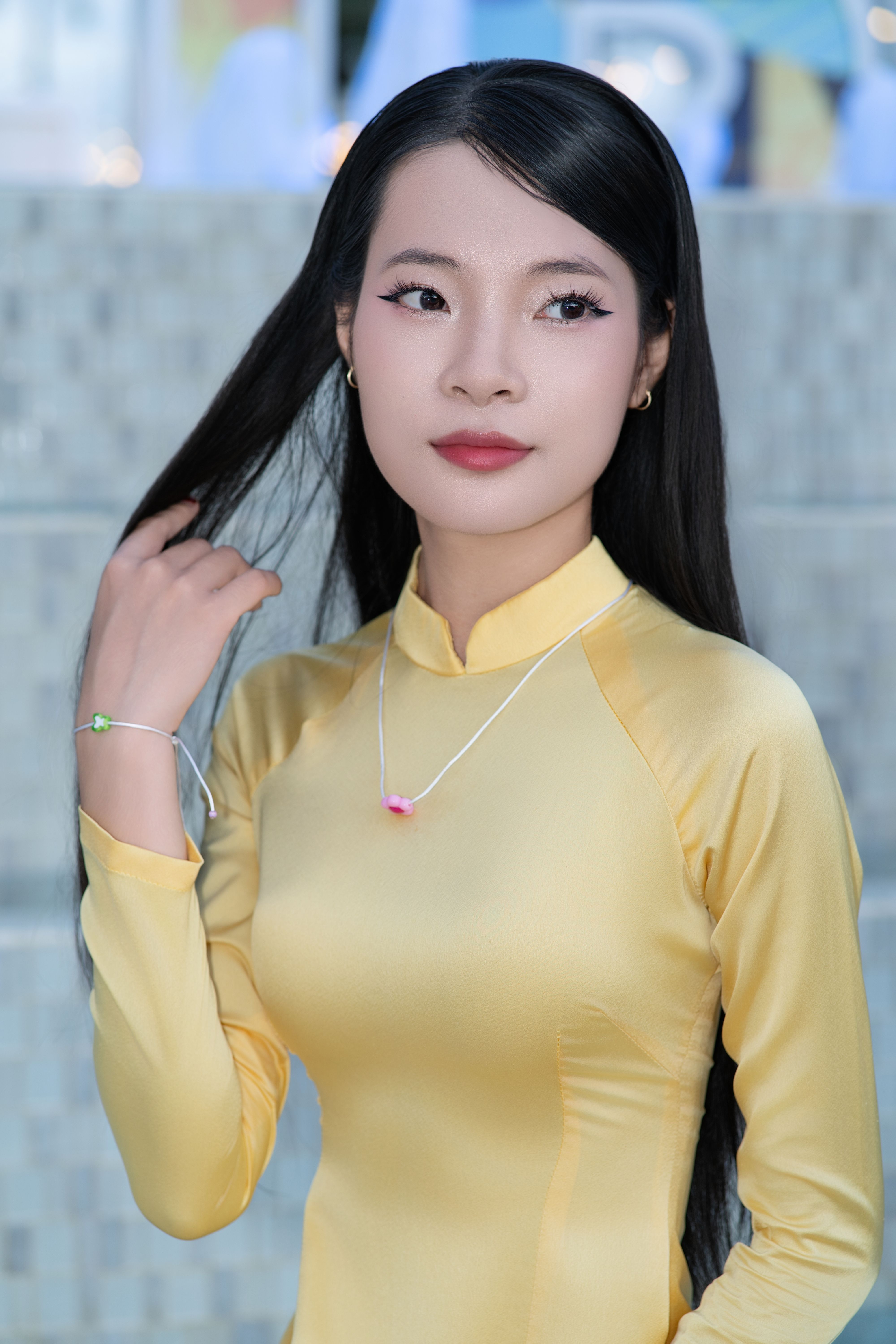 Young Woman in Traditional Yellow Dress Outdoors · Free Stock Photo