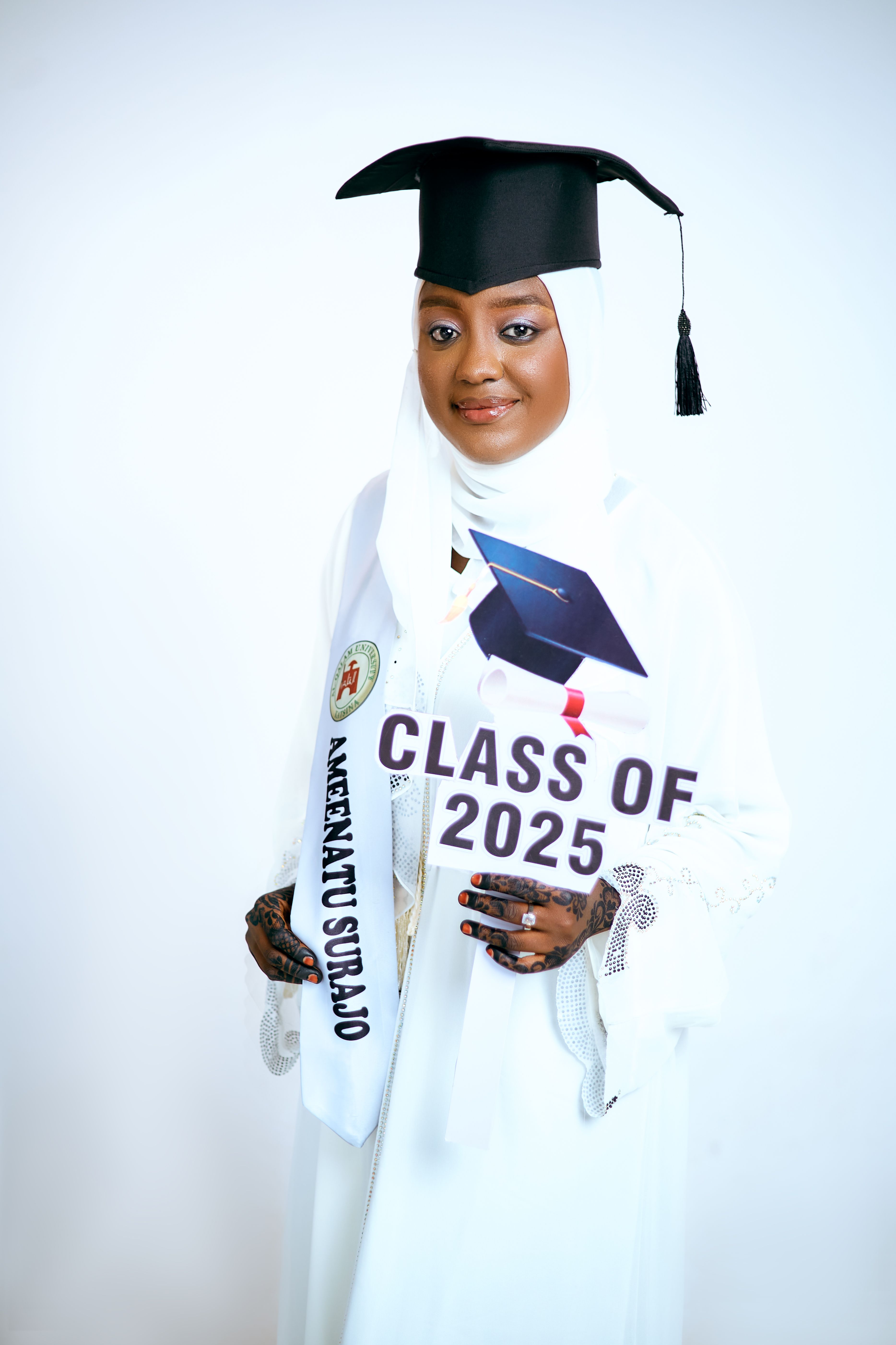 Graduation Portrait of Young Female Graduate · Free Stock Photo