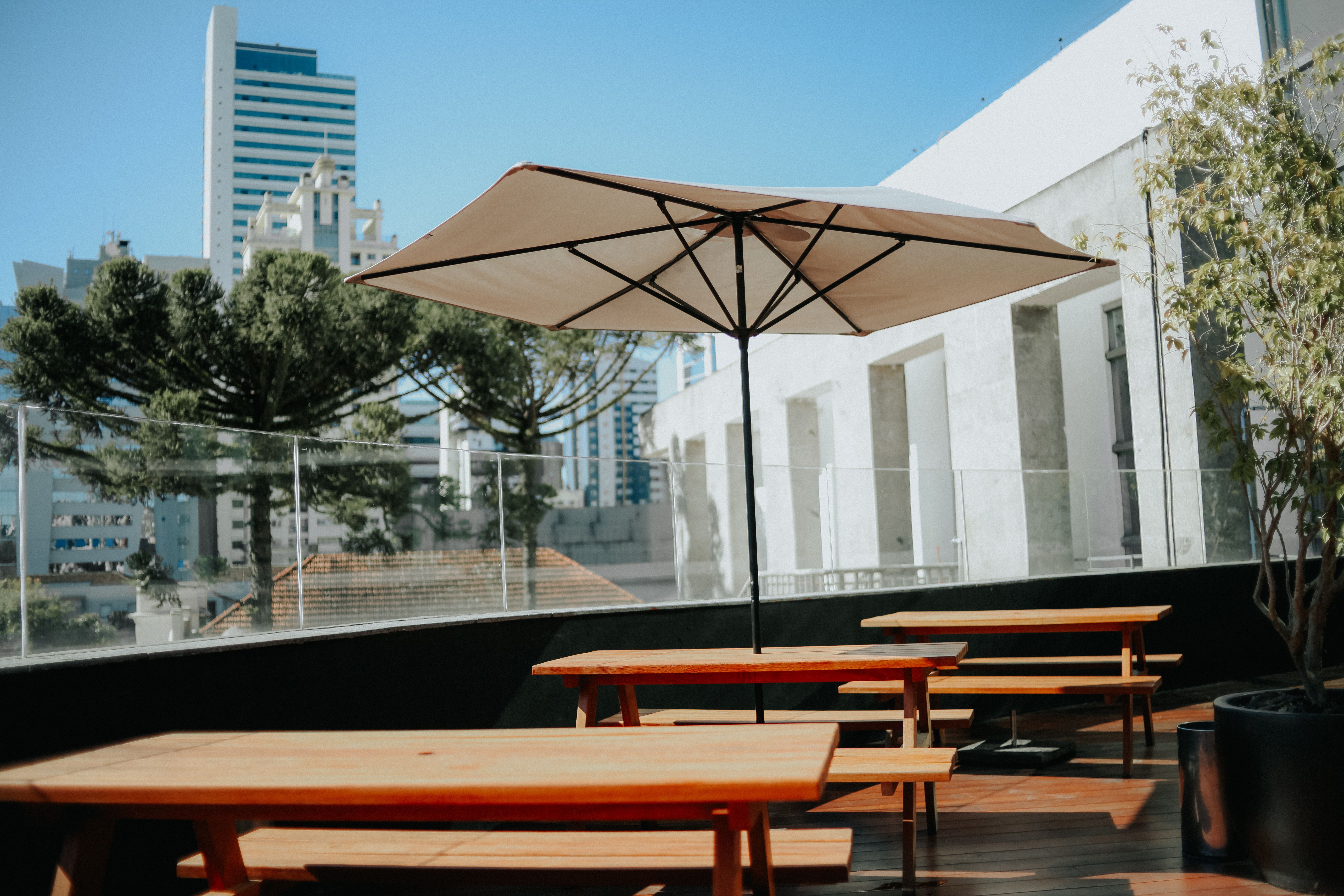 Modern Rooftop Patio with City Skyline View · Free Stock Photo