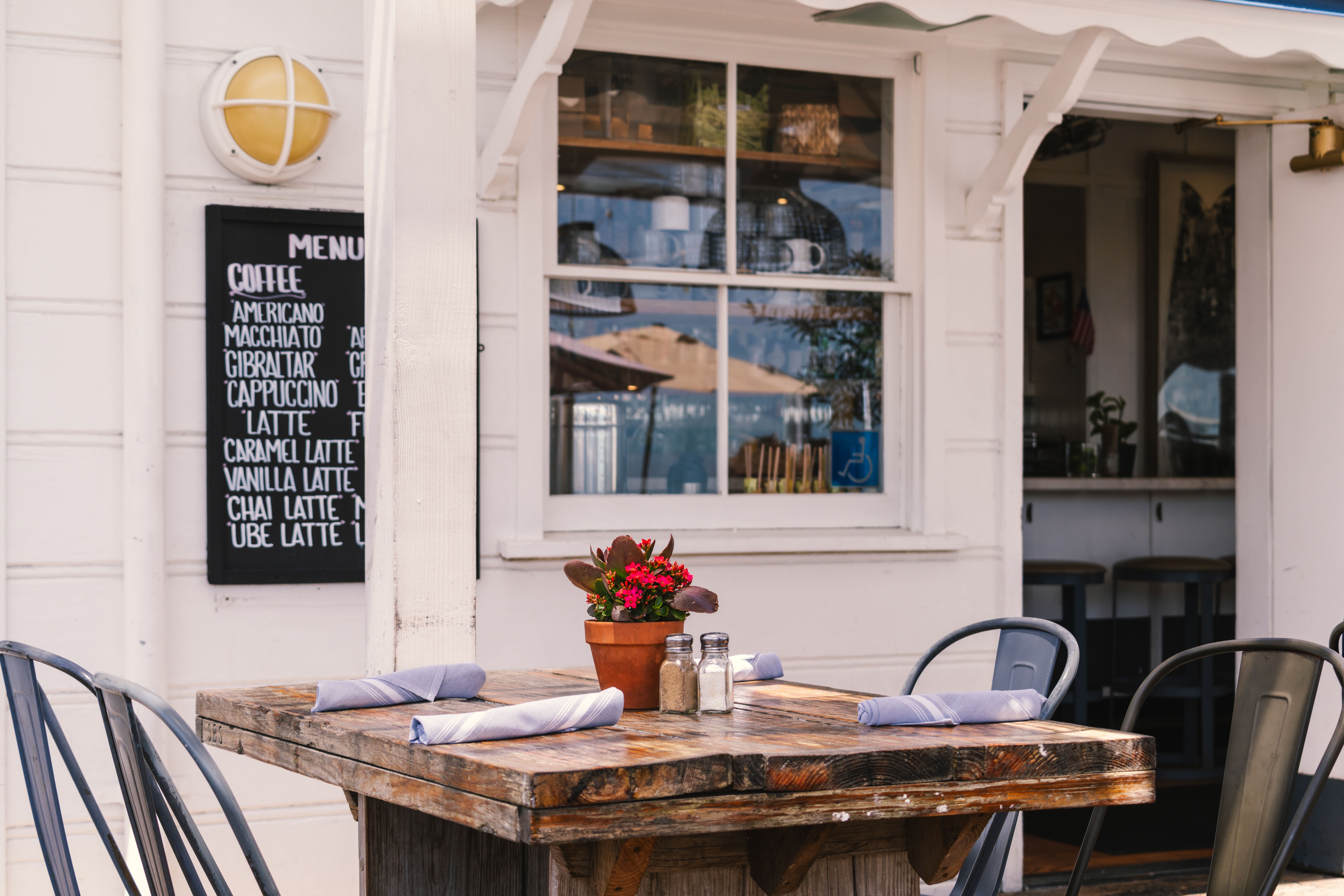 Coastal Cafe Seating with Ocean View in Malibu · Free Stock Photo