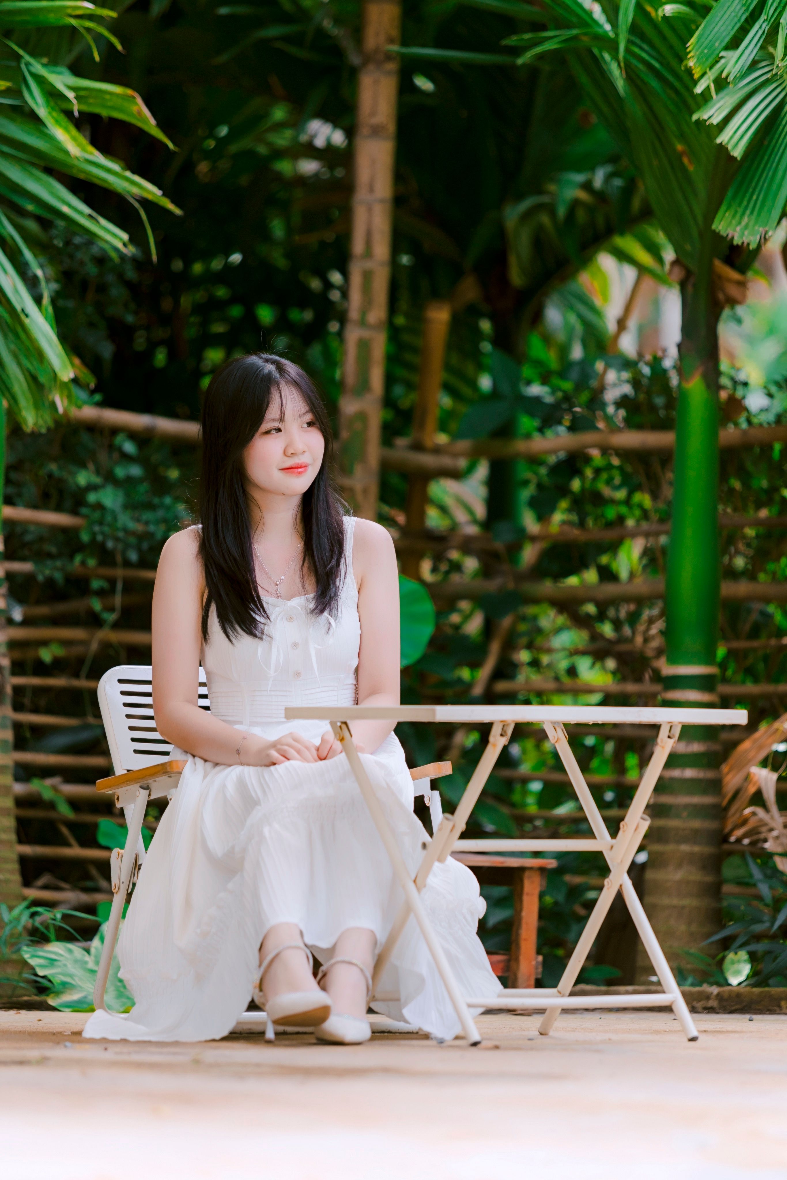 A Woman Sitting In A Garden Photos, Download The BEST Free A Woman ...