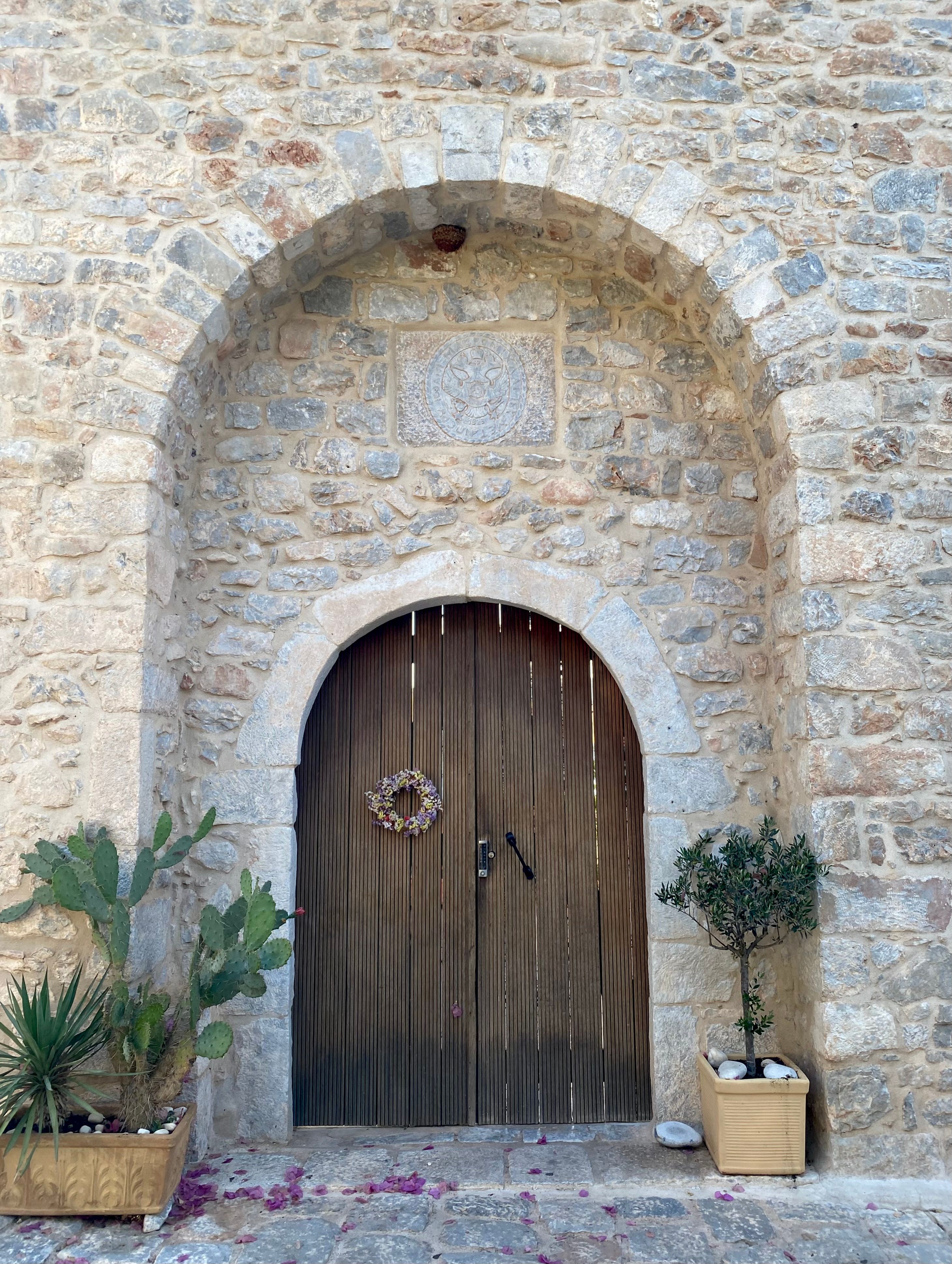 Rustic Stone Archway Entrance with Decor · Free Stock Photo