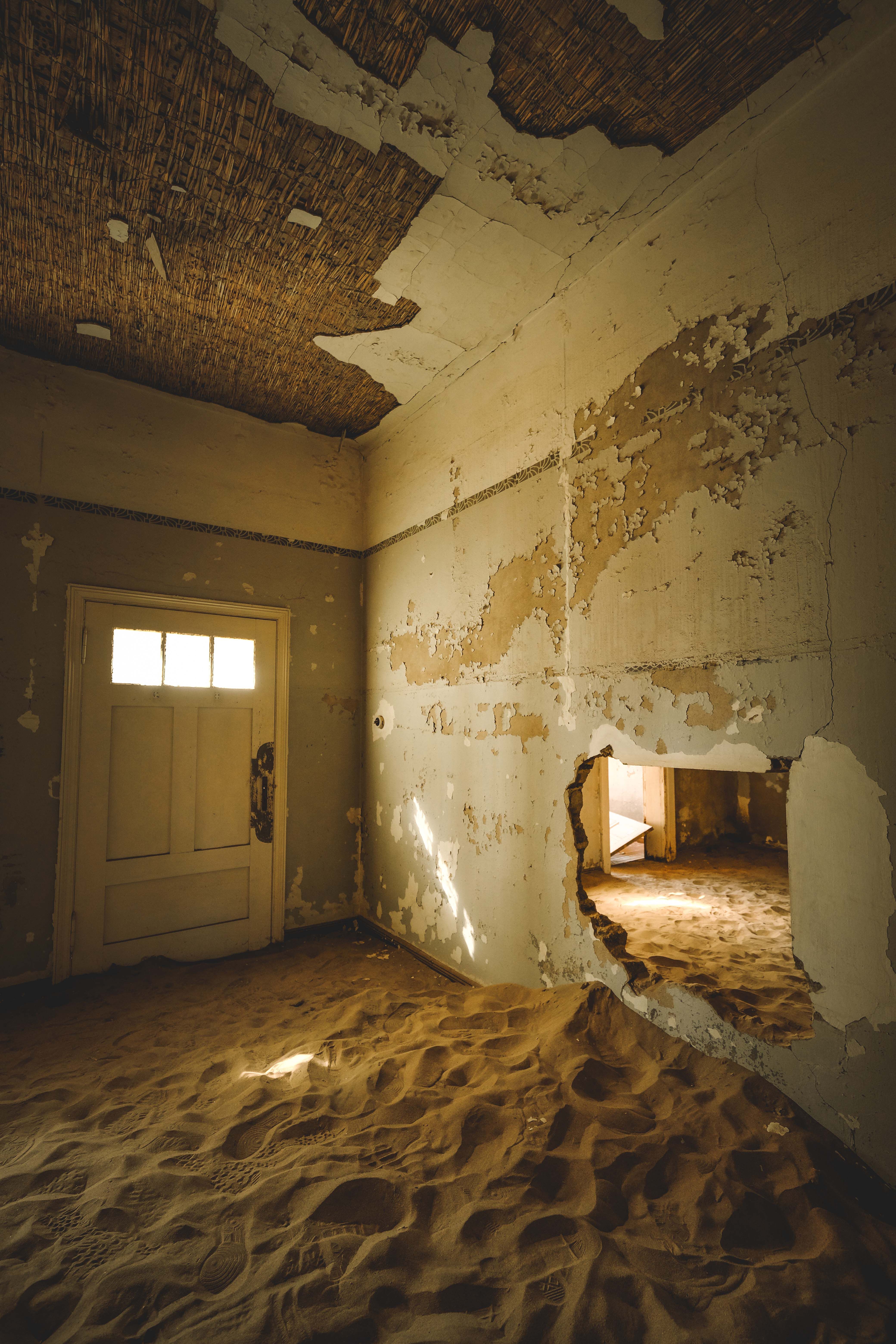 Abandoned Sand-Filled Room in Kolmanskop · Free Stock Photo