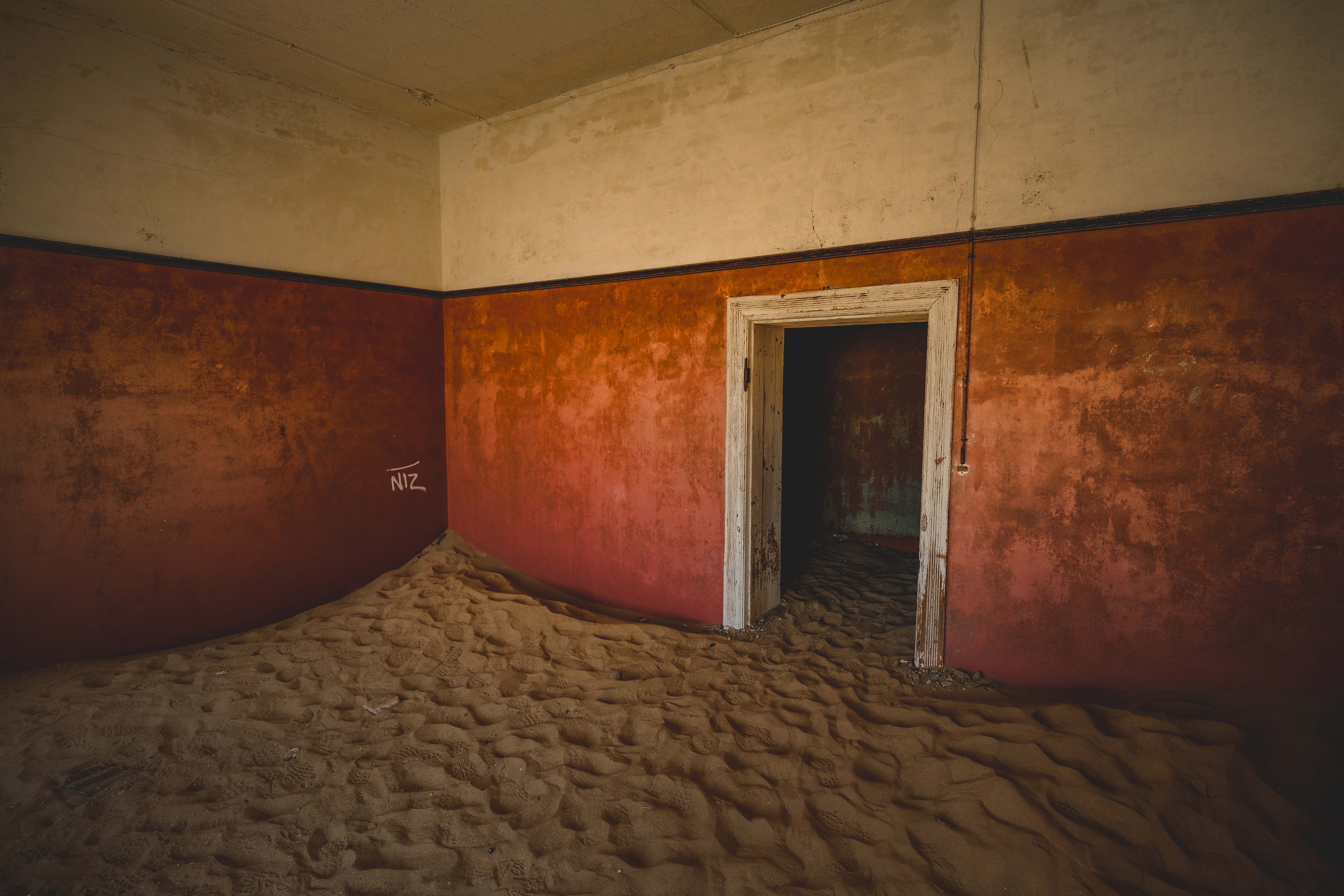Abandoned Sand-Filled Room in Kolmanskop, Namibia · Free Stock Photo