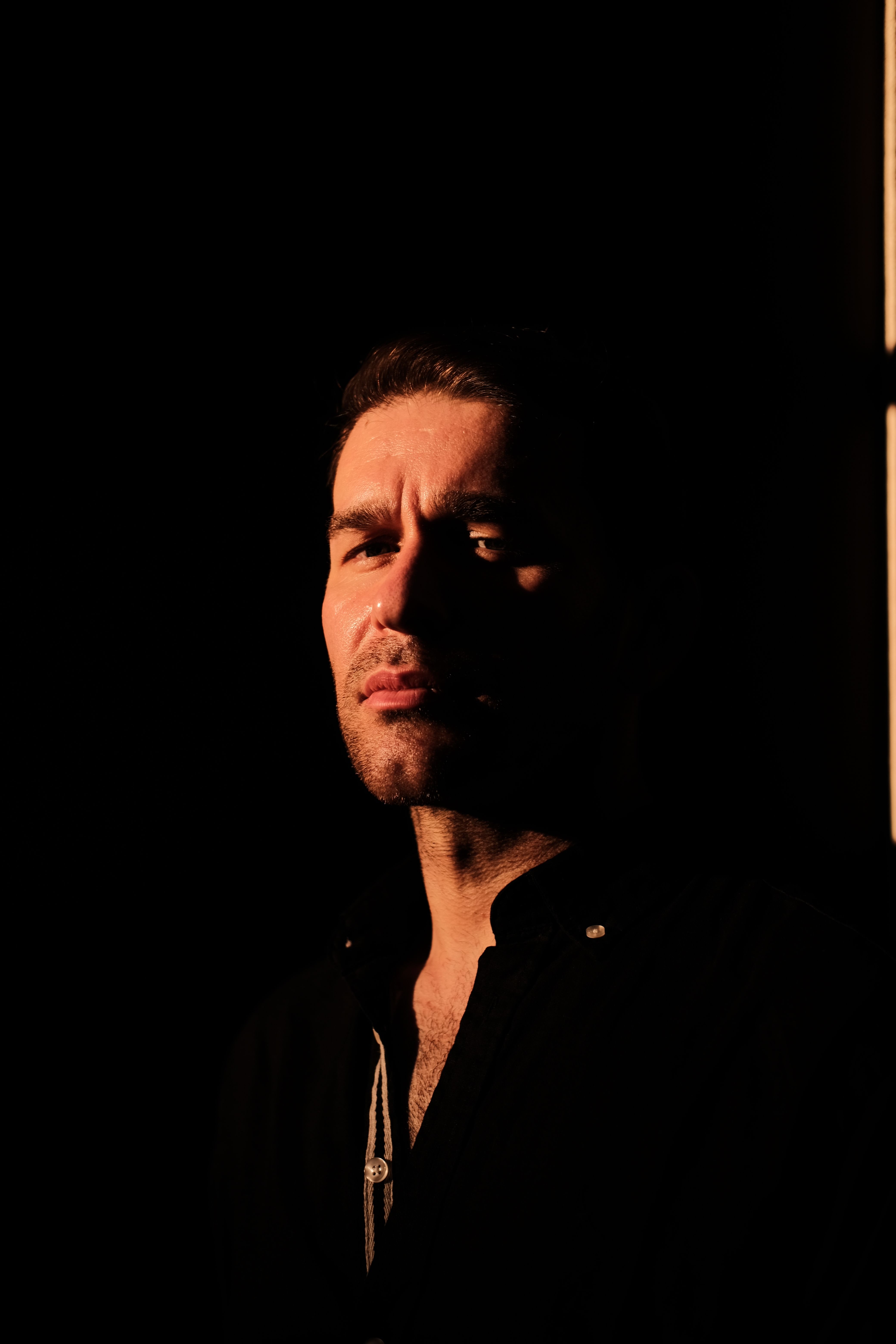 Dramatic Portrait in Low-Key Lighting · Free Stock Photo