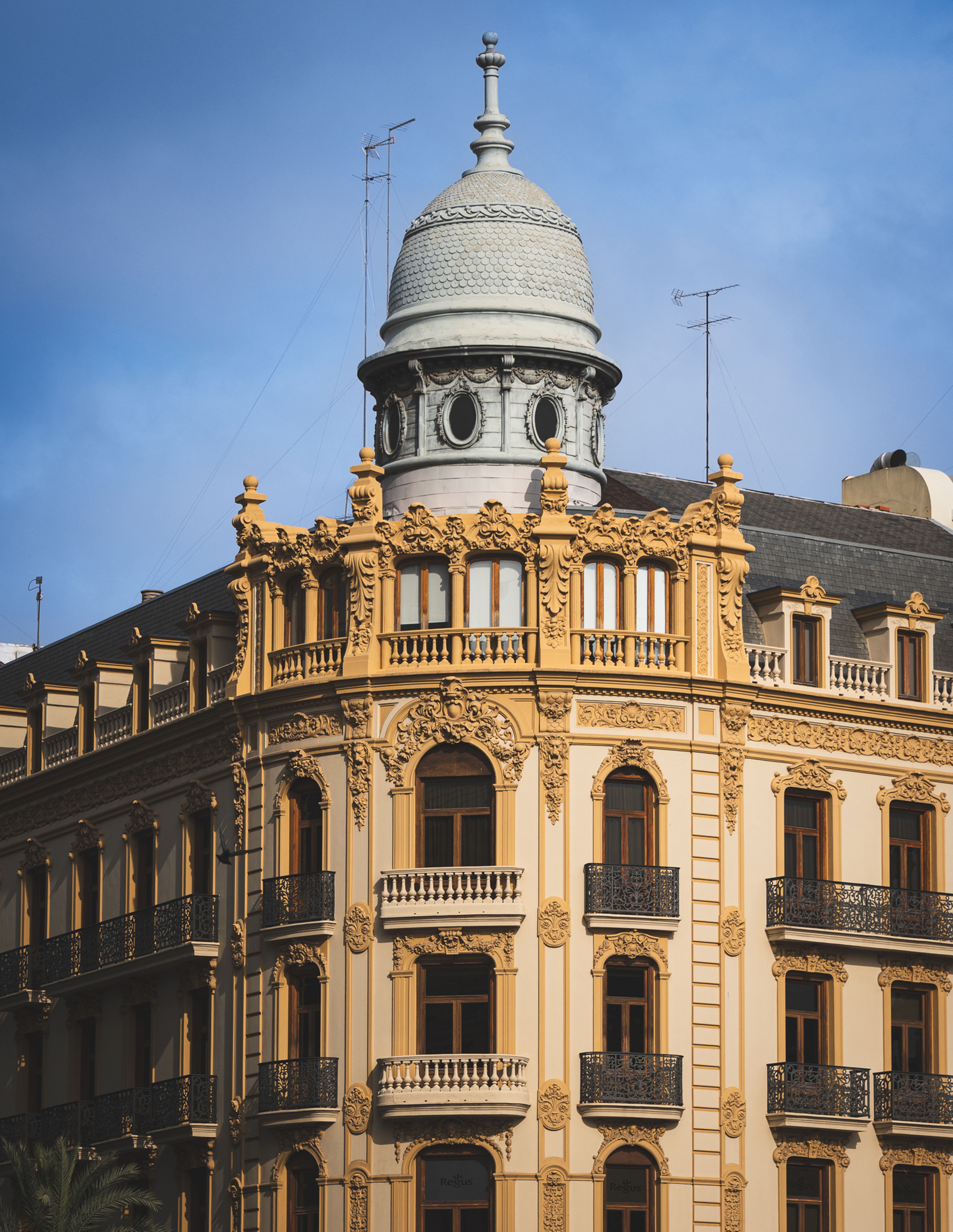 Historic European Building with Ornate Architecture · Free Stock Photo