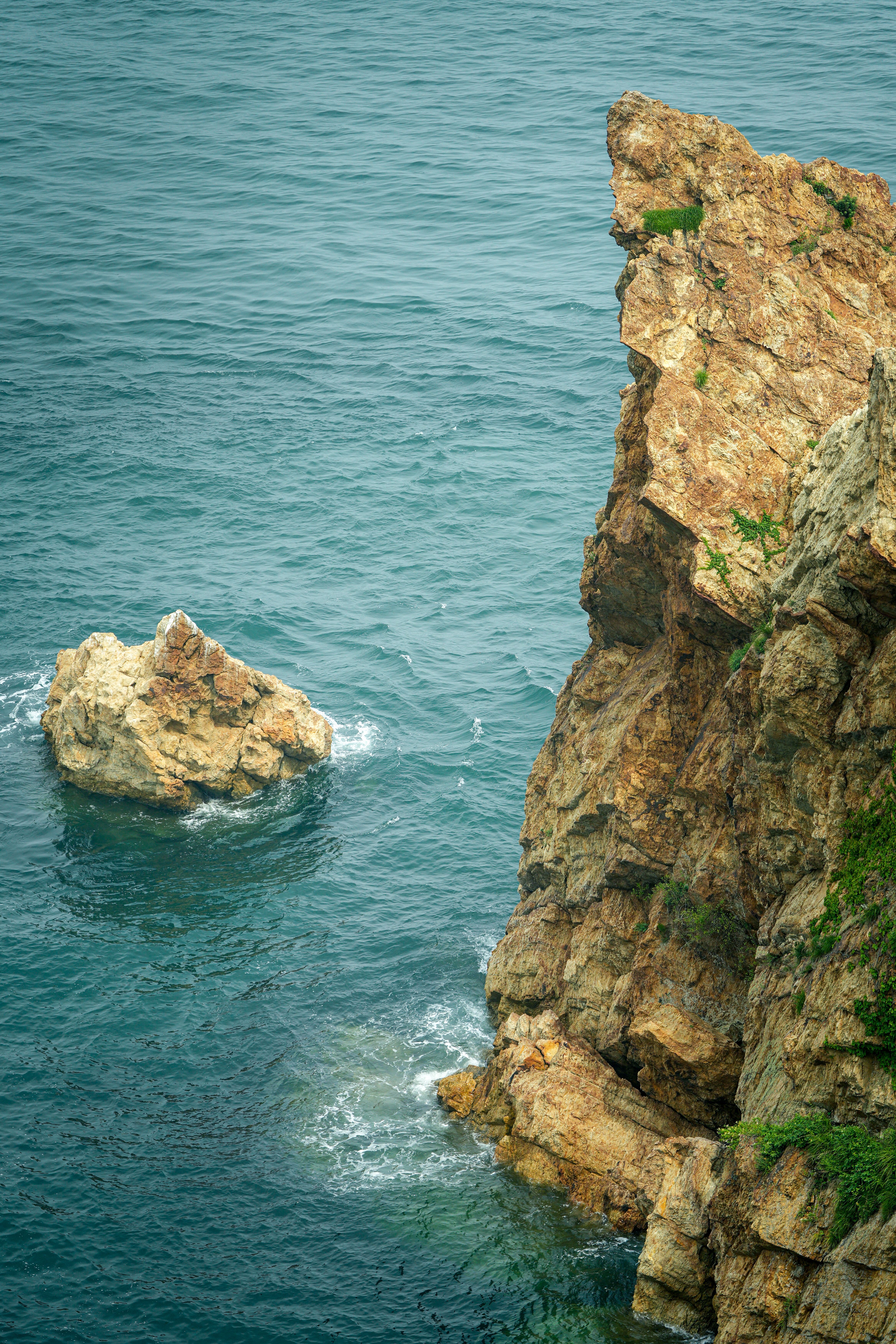 Majestic Ocean Cliffs with Rocky Outcrops · Free Stock Photo