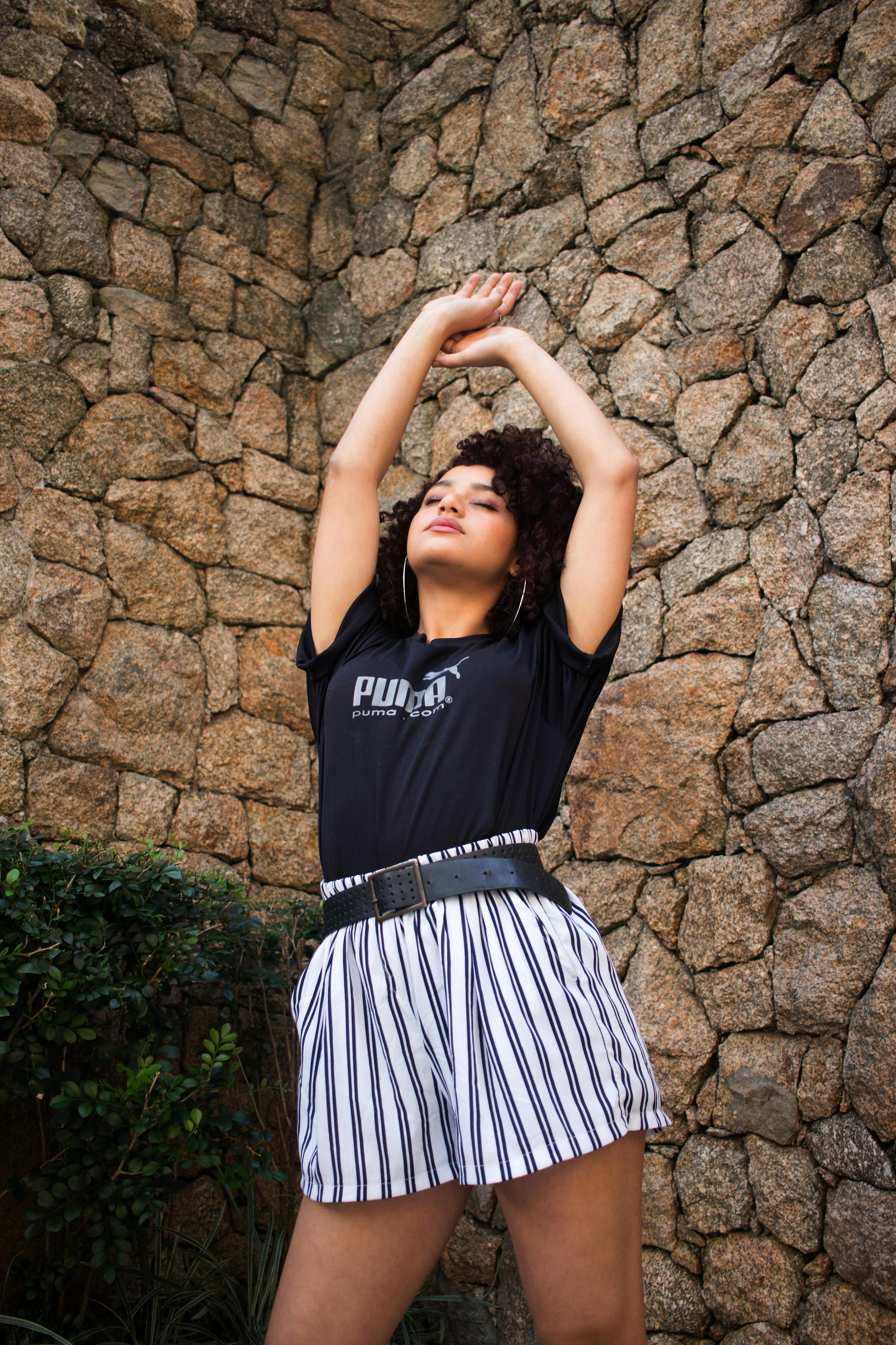 Photo of Woman Standing Against Nature Background · Free Stock Photo