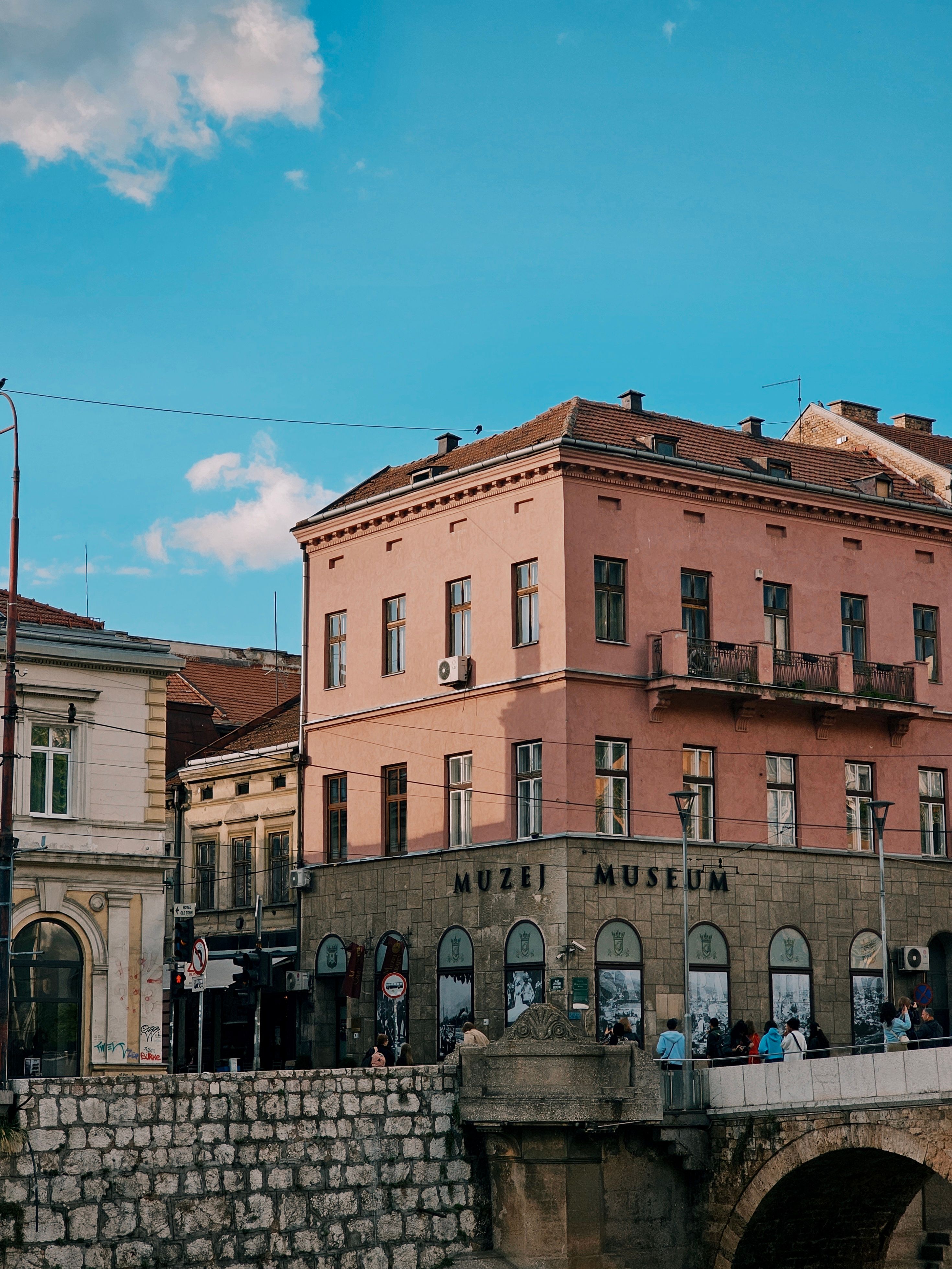 Historic Sarajevo Muzej Building Along the River · Free Stock Photo