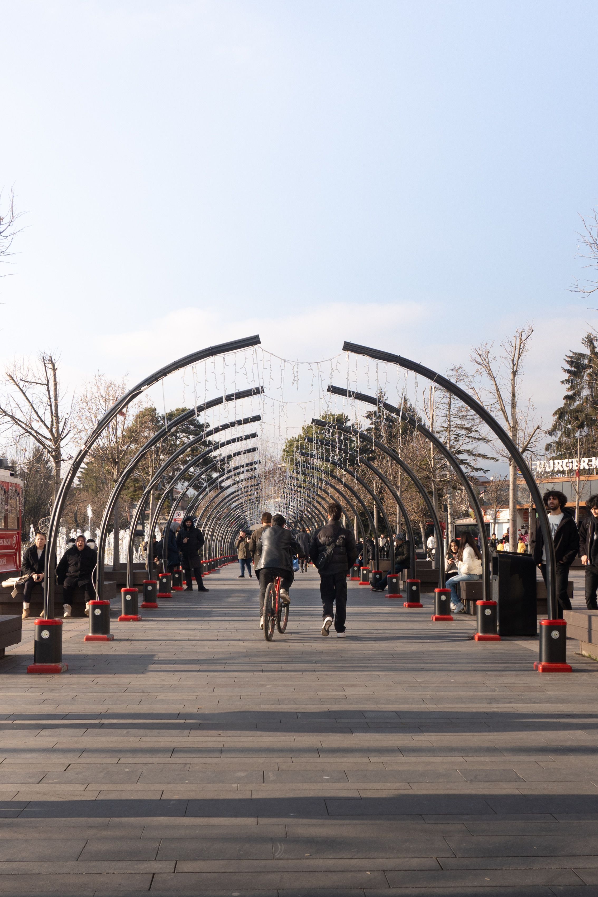 Modern Pedestrian Pathway with Archway Lighting · Free Stock Photo