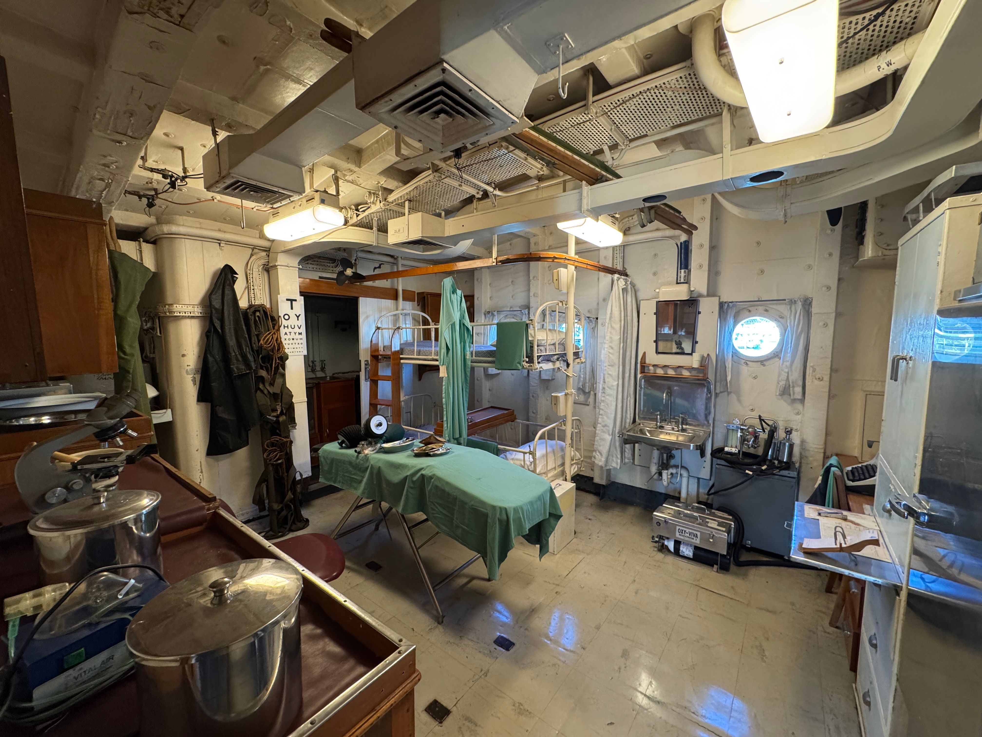 Vintage Naval Hospital Ship Interior with Medical Setup · Free Stock Photo