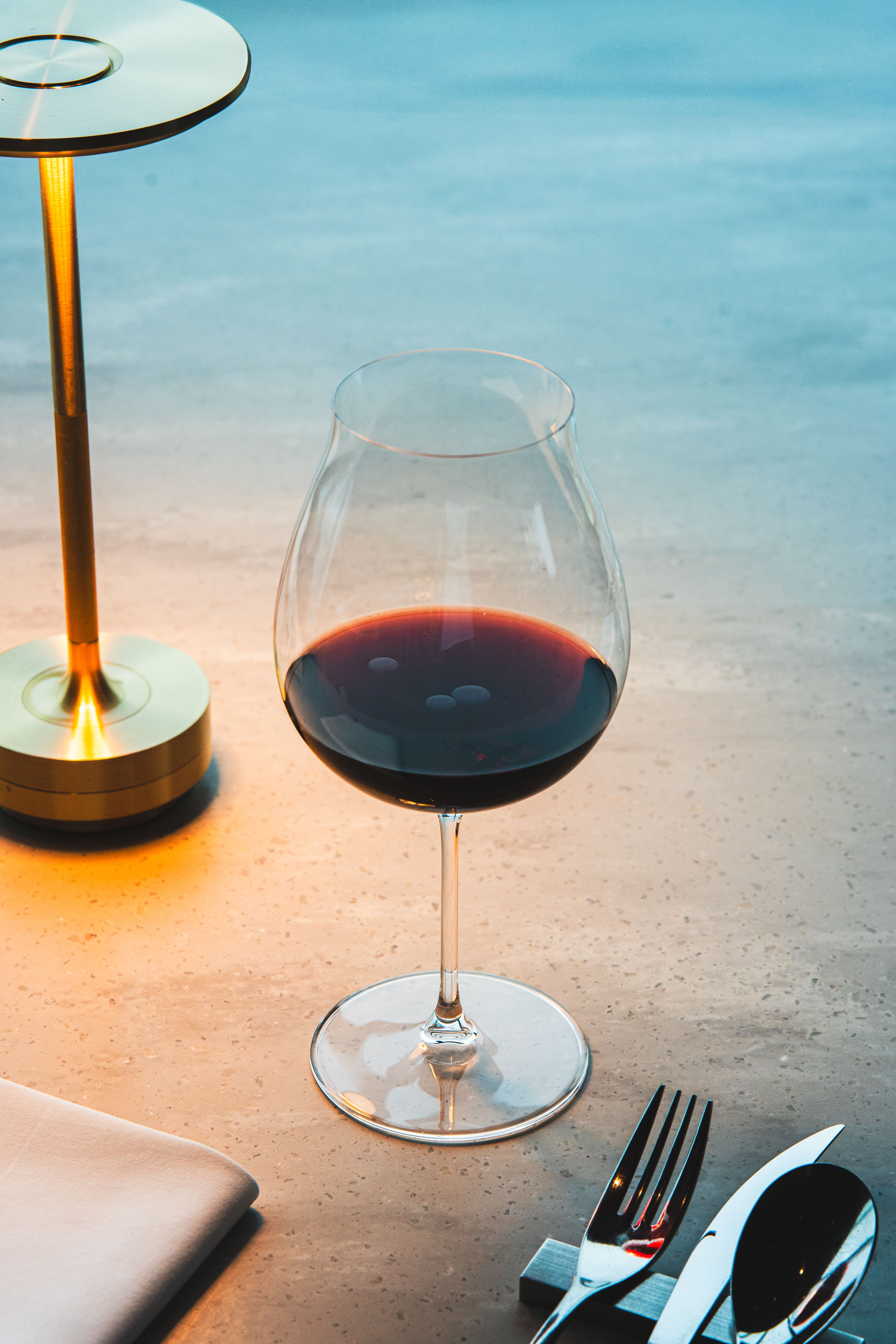 Elegant Wine Glass on Restaurant Table Setting · Free Stock Photo
