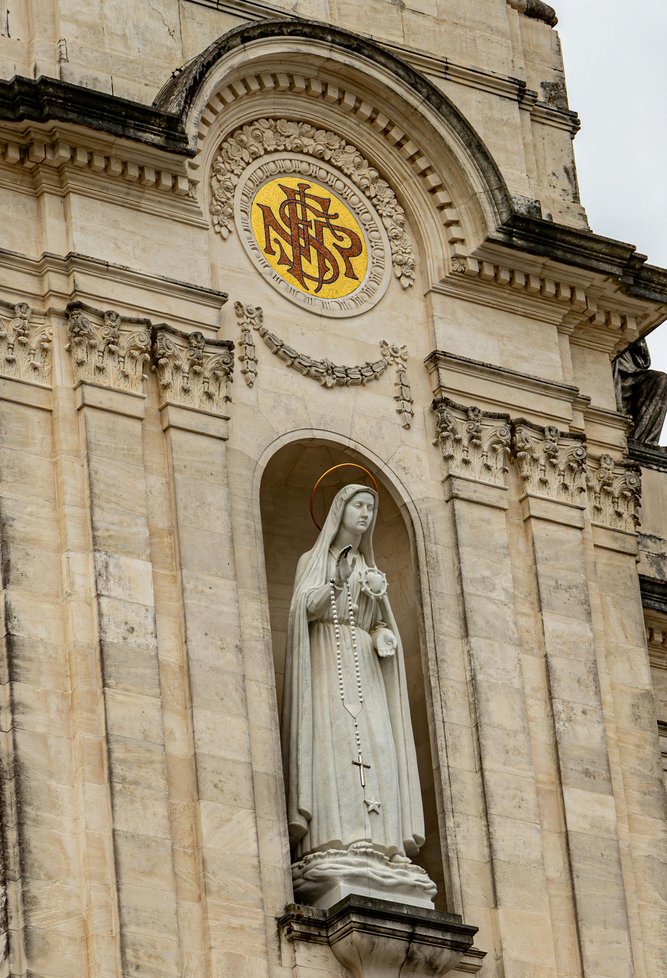 Statue of Saint on Fátima Sanctuary Facade · Free Stock Photo
