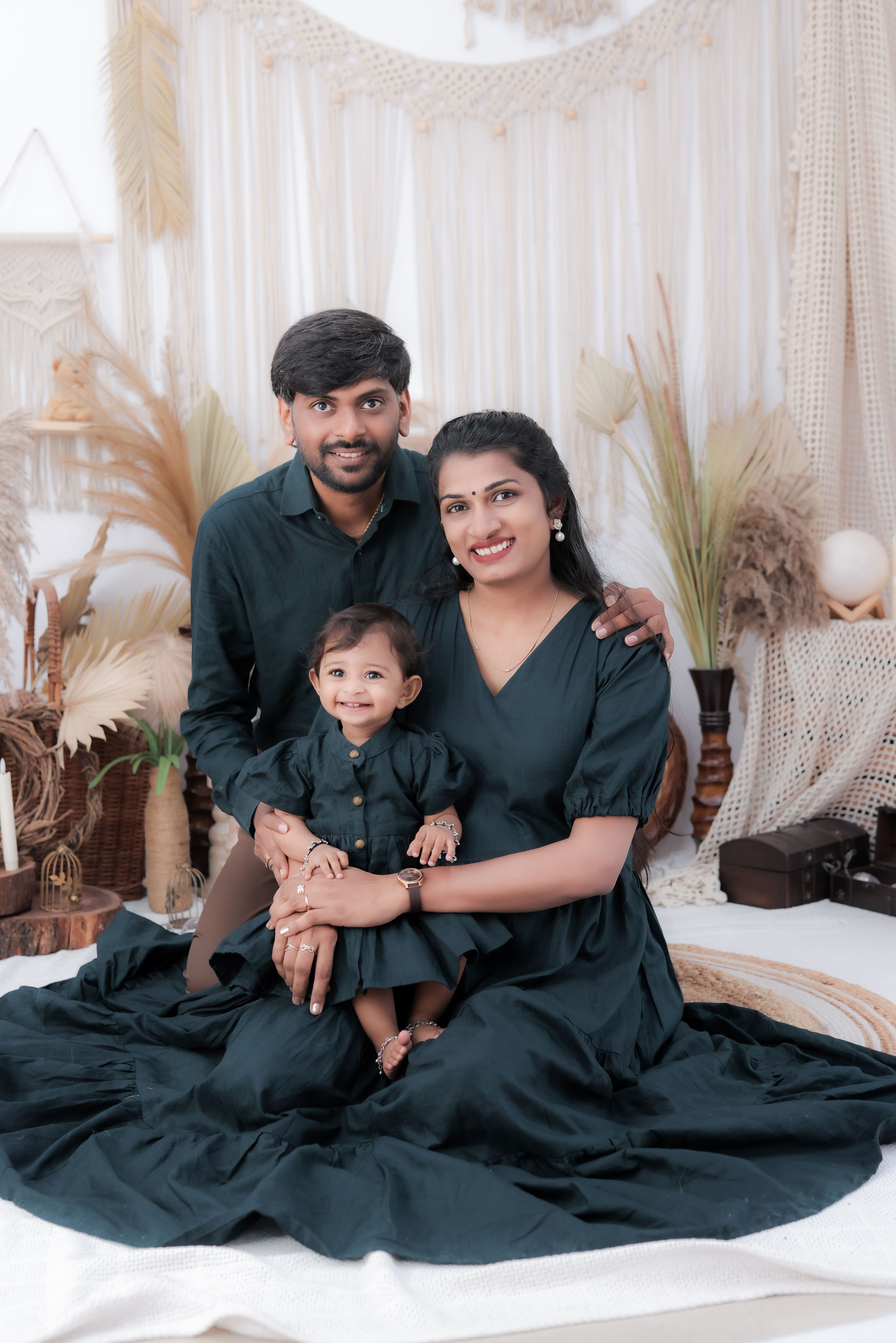 Family Portrait in Cozy Bohemian Setting · Free Stock Photo