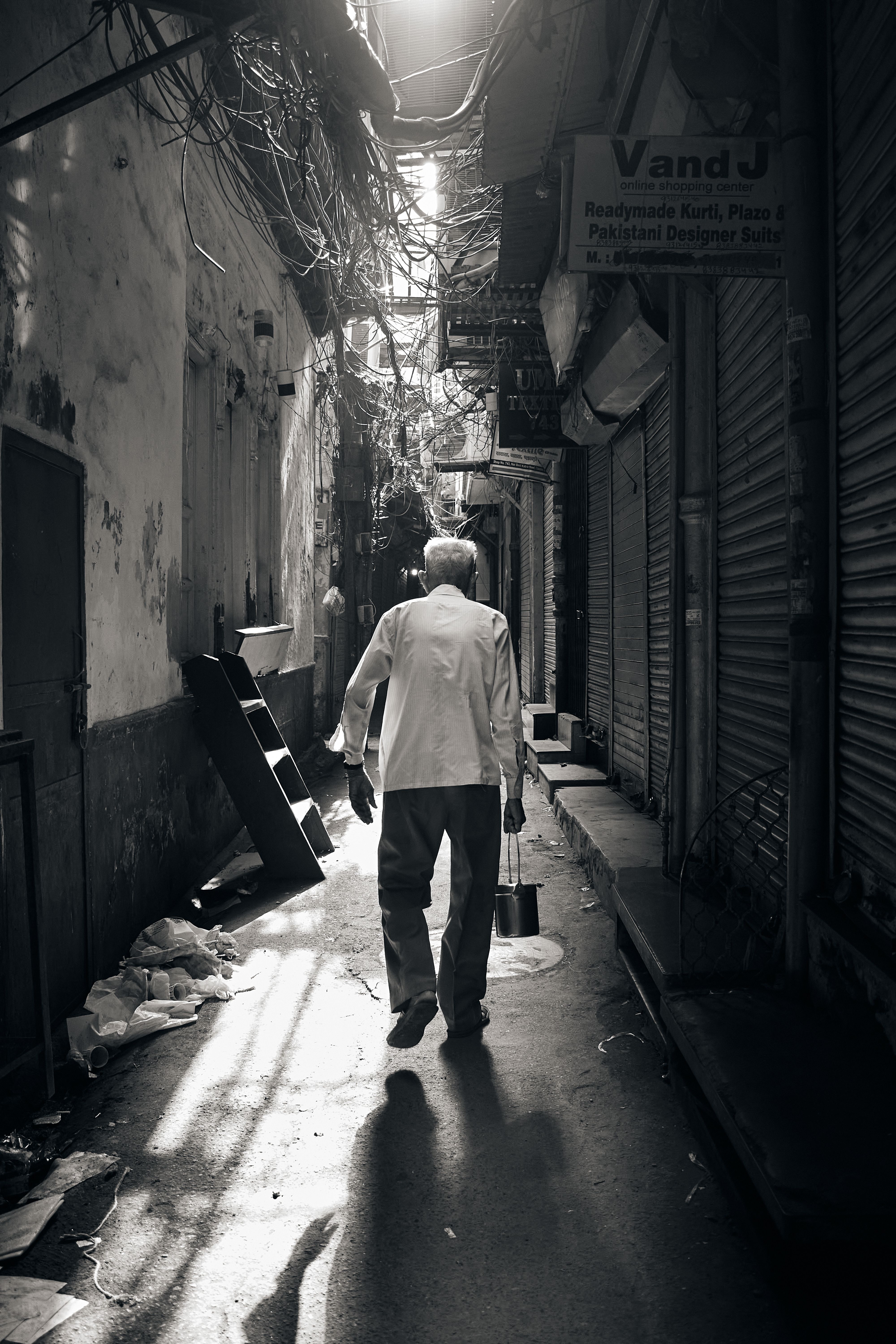 Solitary Walk in Narrow Indian Alleyway · Free Stock Photo