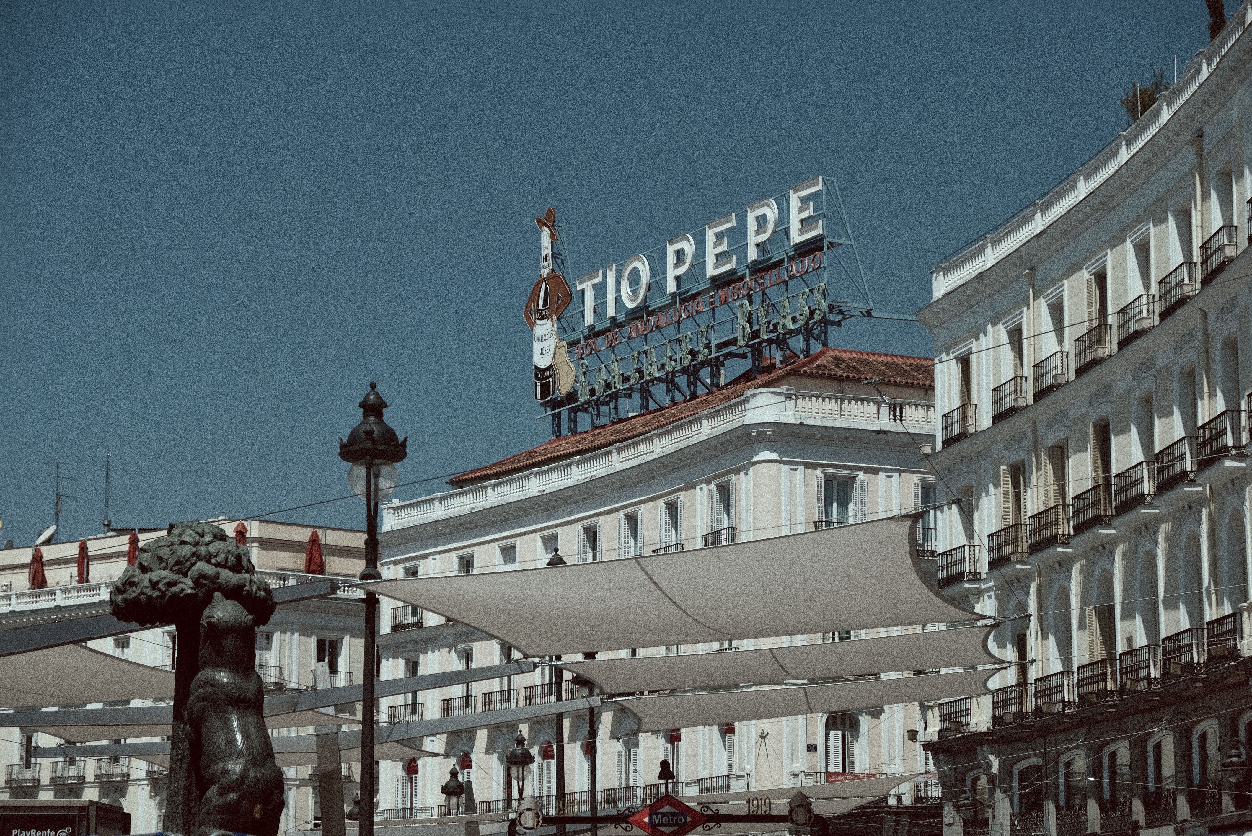 Historic Puerta del Sol with Tio Pepe Sign in Madrid · Free Stock Photo