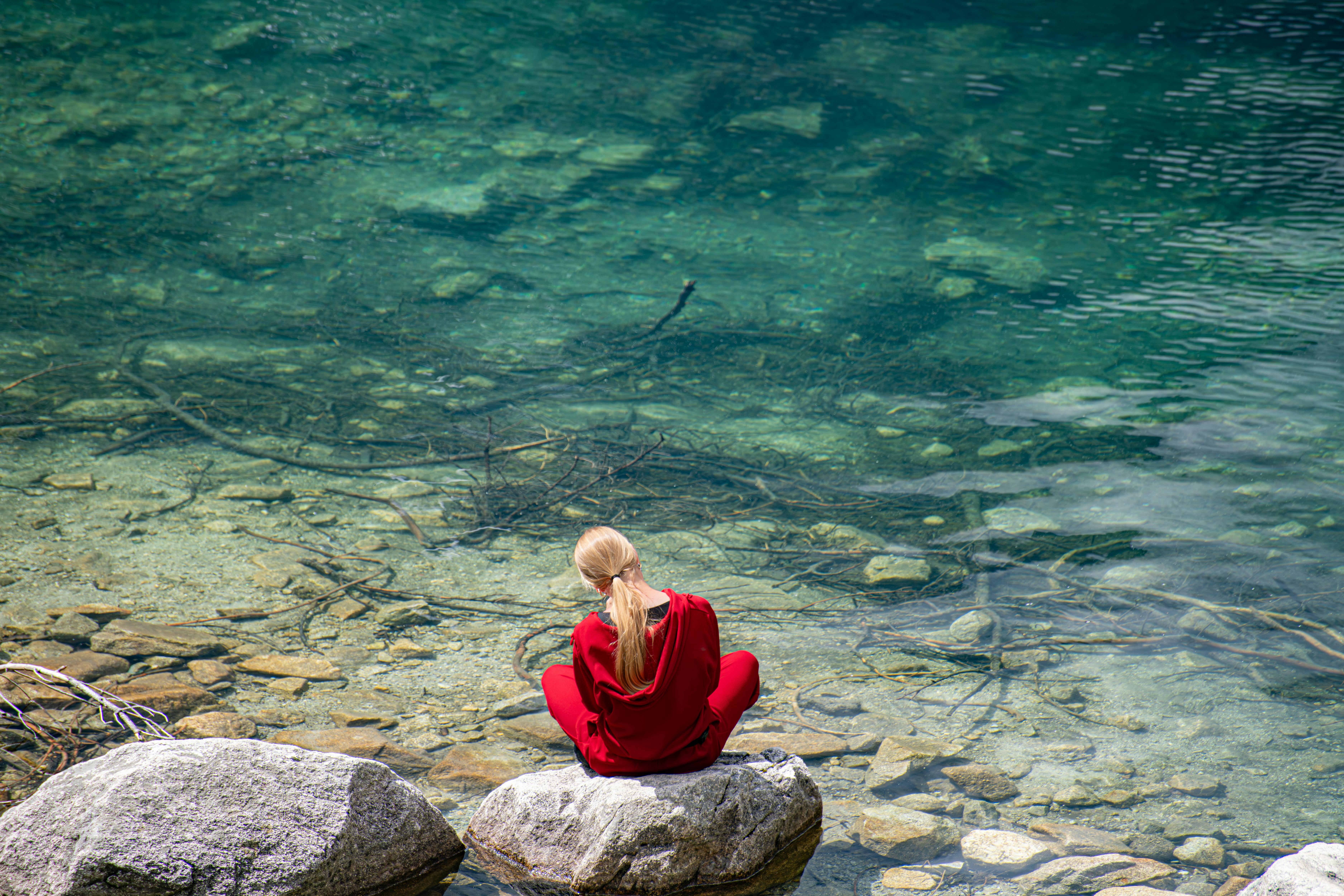 Woman in Red Relaxing by Mountain Lake in Poland · Free Stock Photo