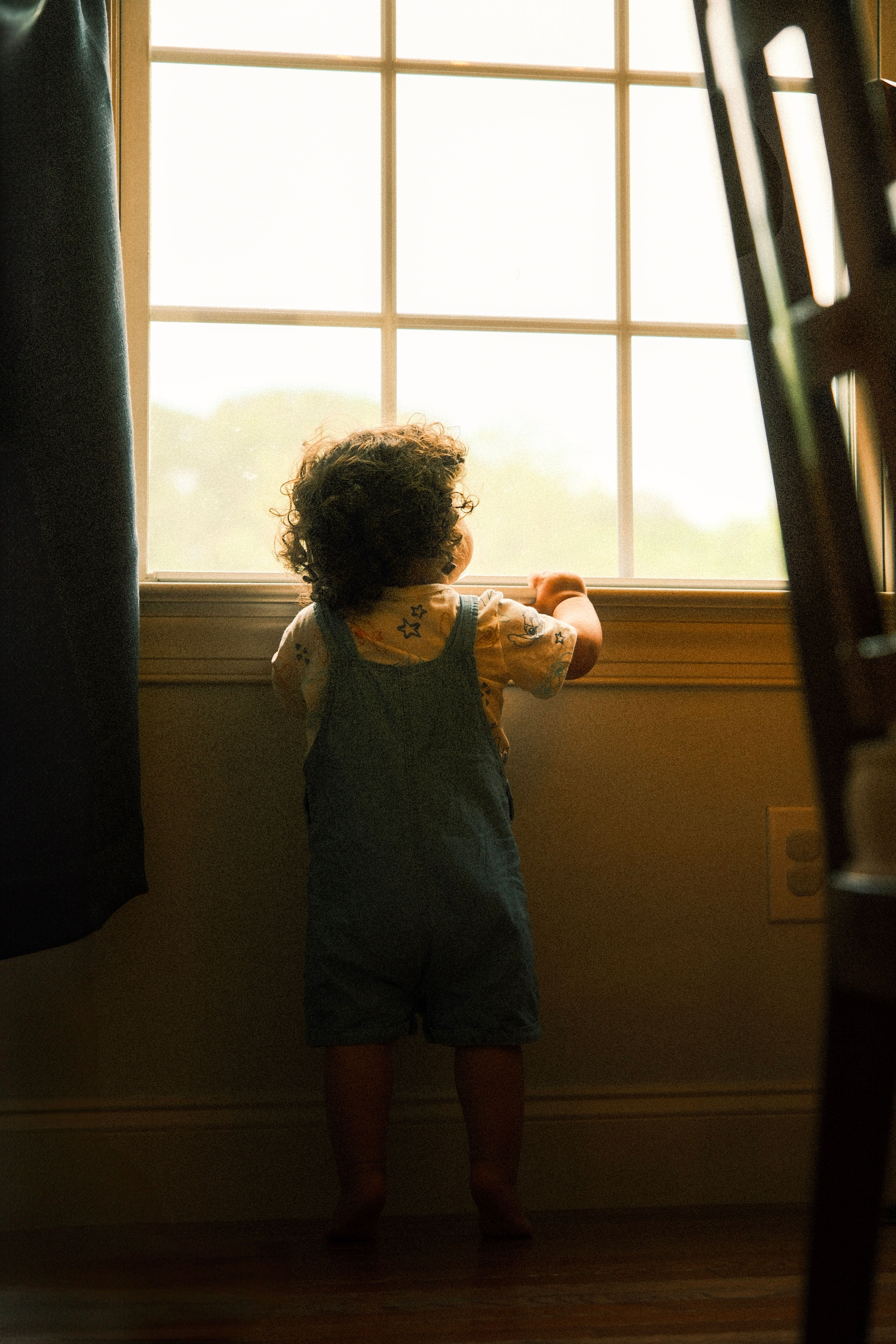 Selective Focus Photography of a Baby Looking Through The Window · Free ...