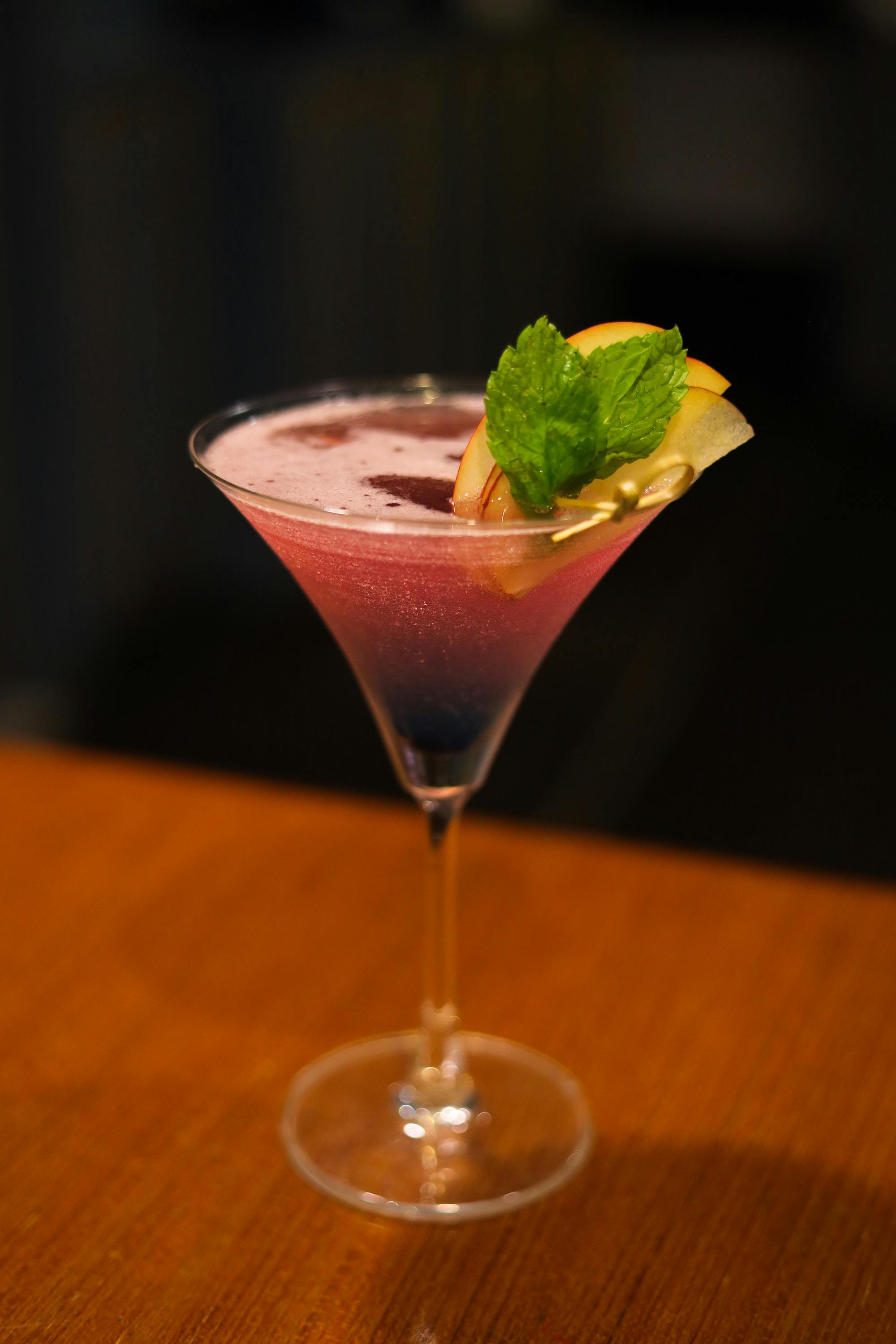 Elegant Pink Cocktail with Fresh Garnish · Free Stock Photo