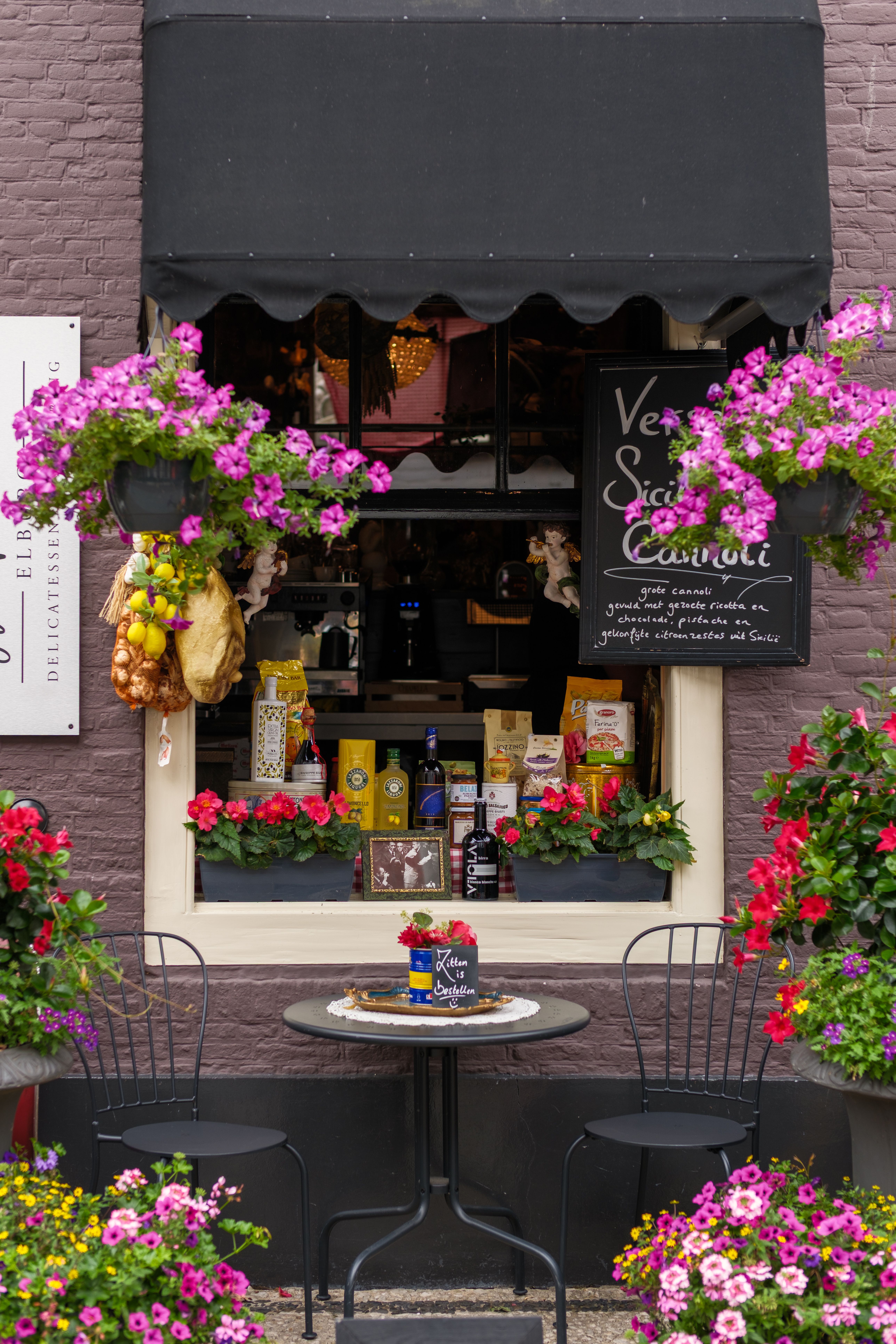 Charming Cafe Front with Floral Decor and Italian Delicacies · Free ...