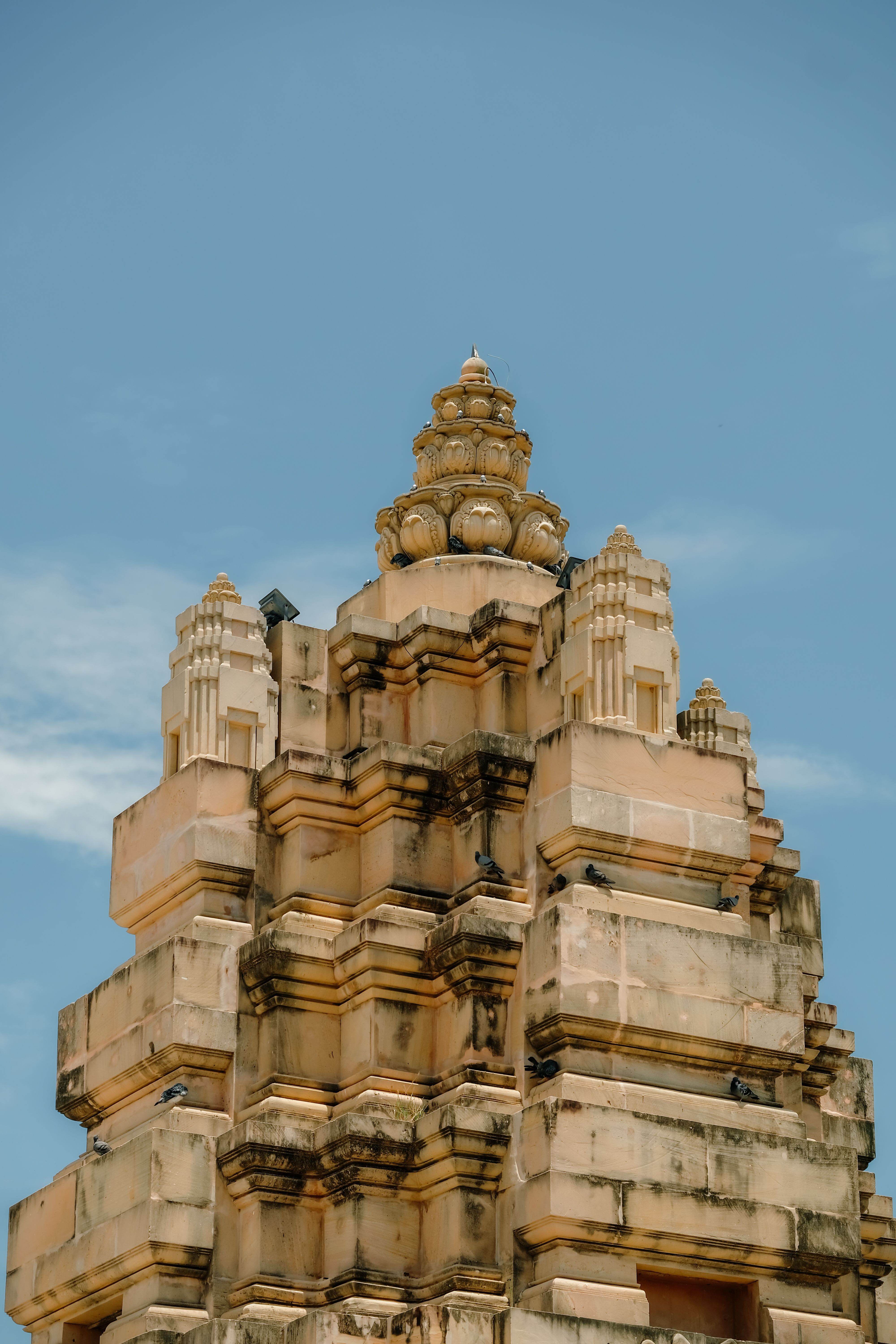 Majestic Ancient Temple Tower Against Blue Sky · Free Stock Photo