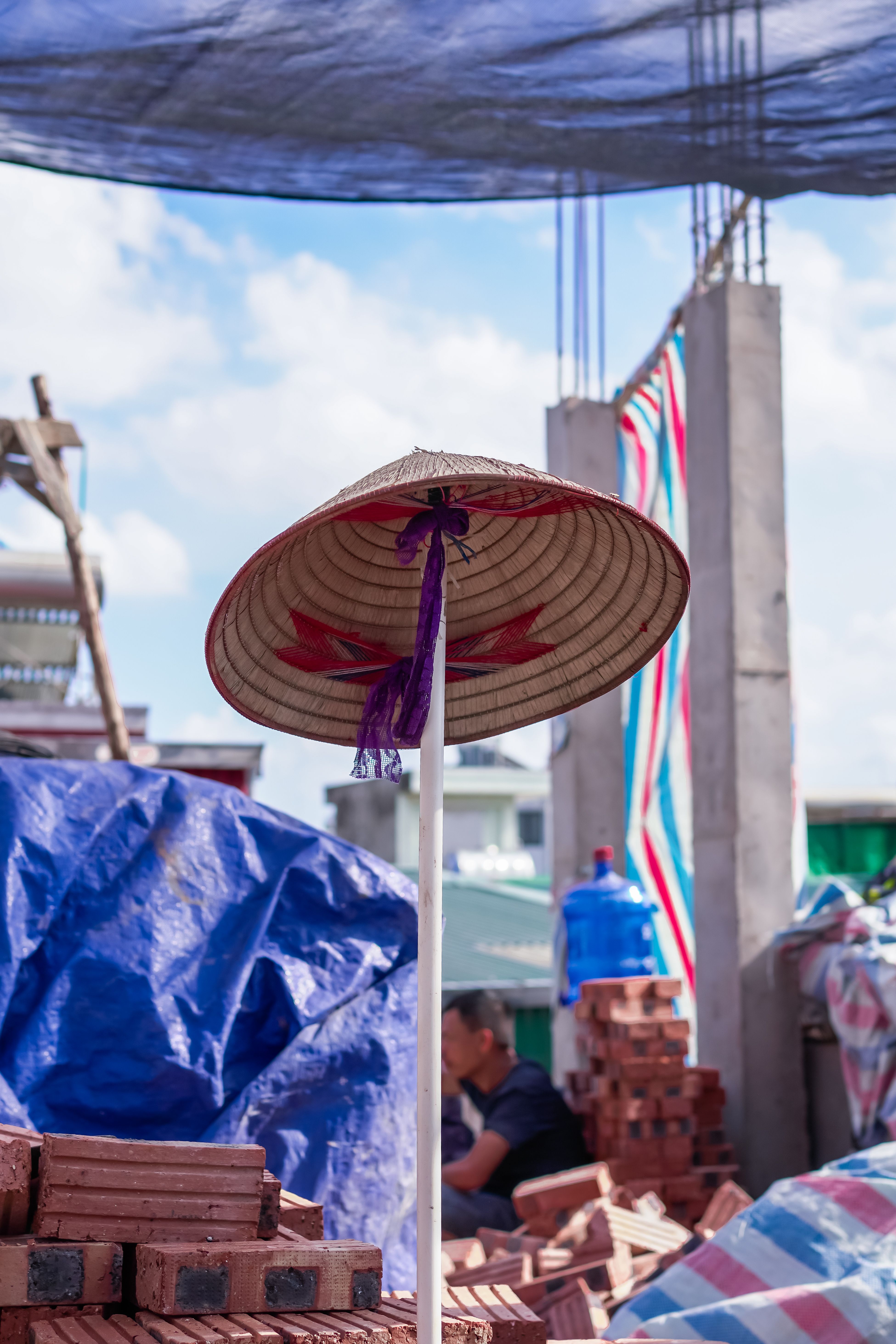 Traditional Conical Hat on Construction Site in Vietnam · Free Stock Photo