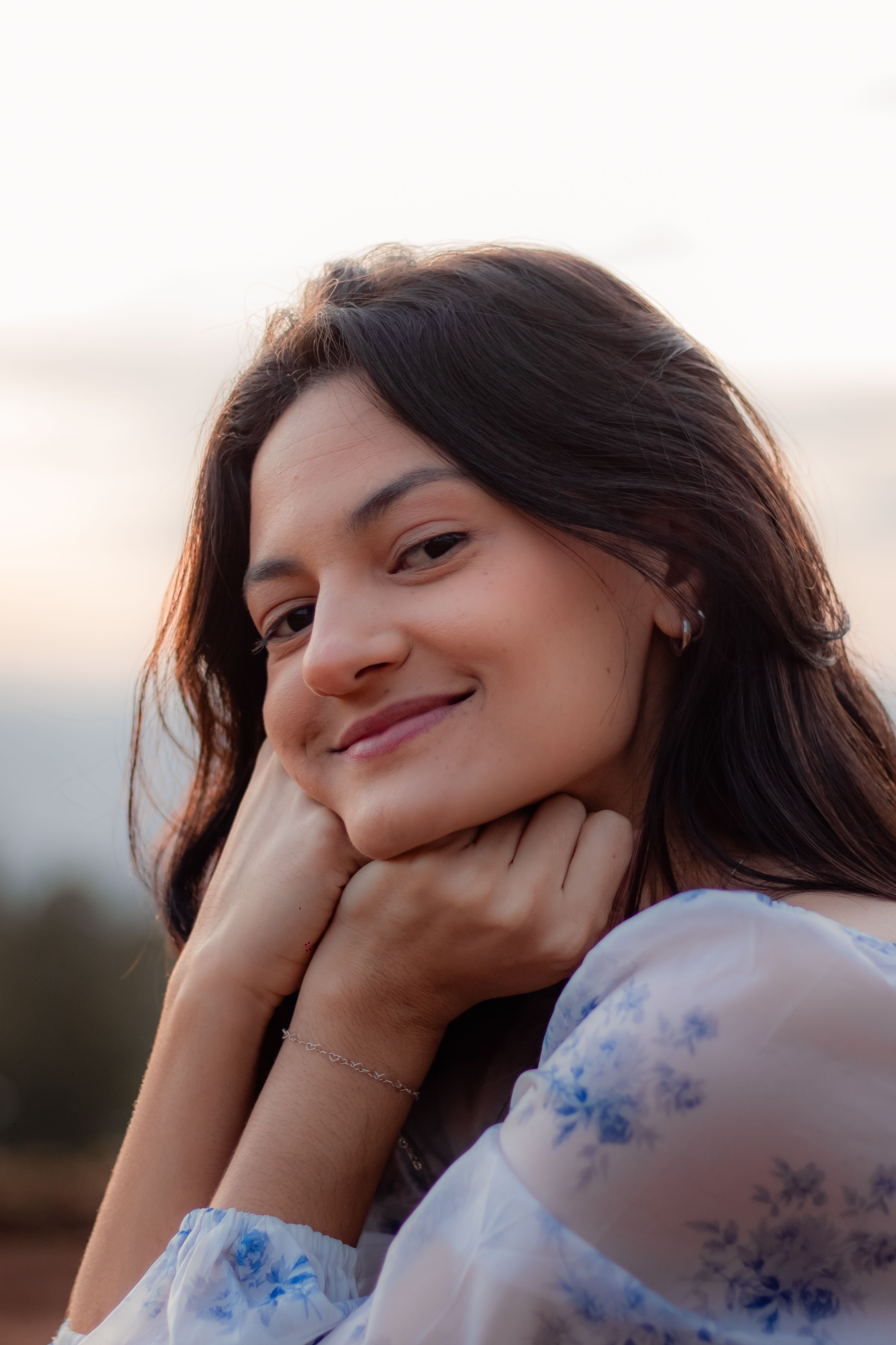 Smiling Woman Outdoors in Soft Evening Light · Free Stock Photo